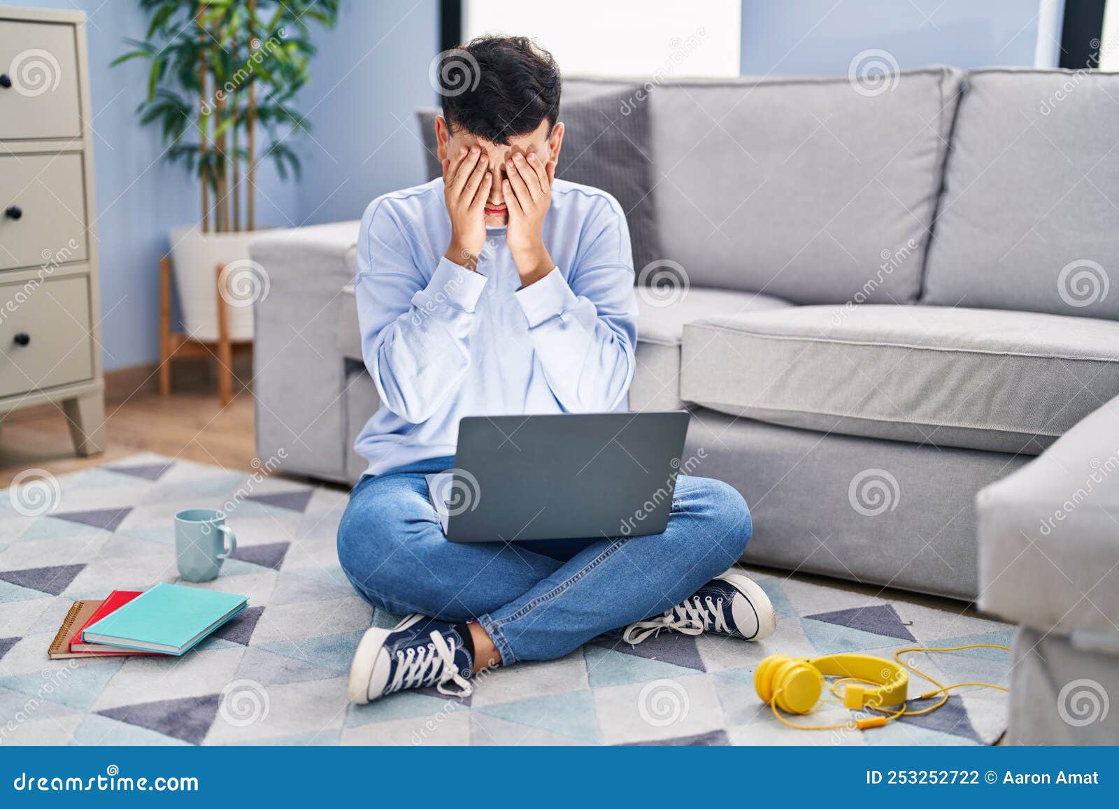 Non Binary Person Studying Using Computer Laptop Sitting on the Floor ...