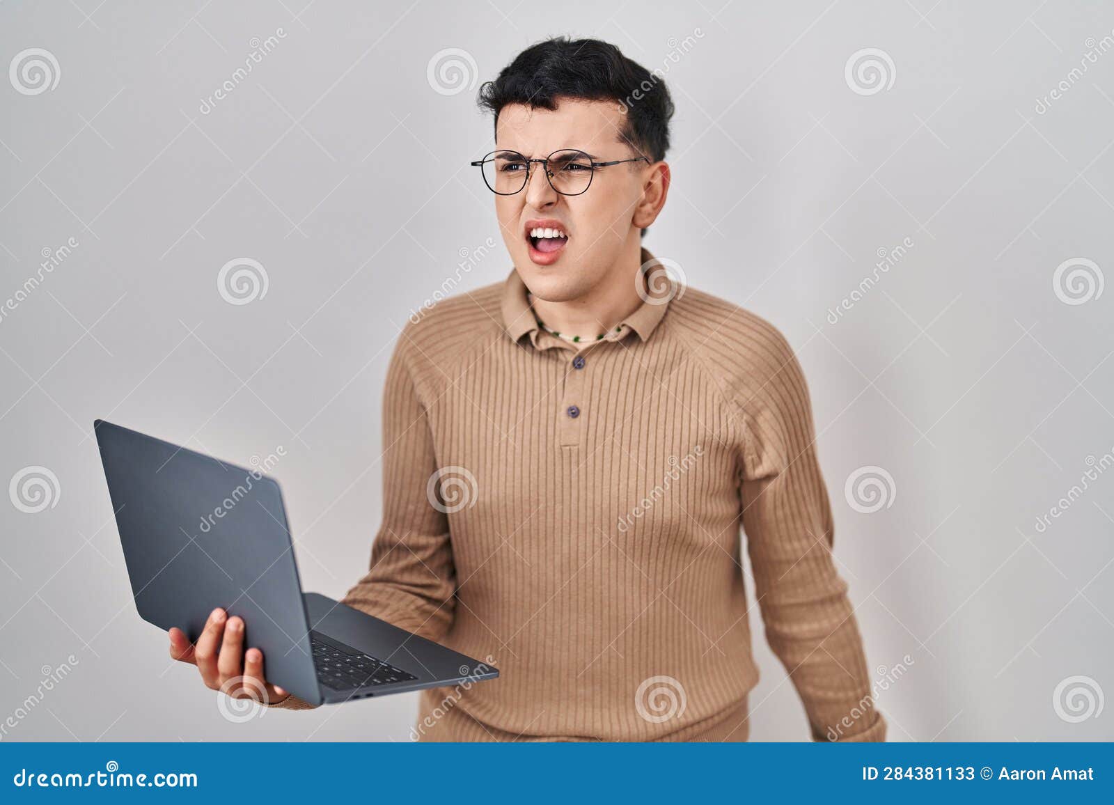 Non Binary Person Using Computer Laptop Angry and Mad Screaming ...