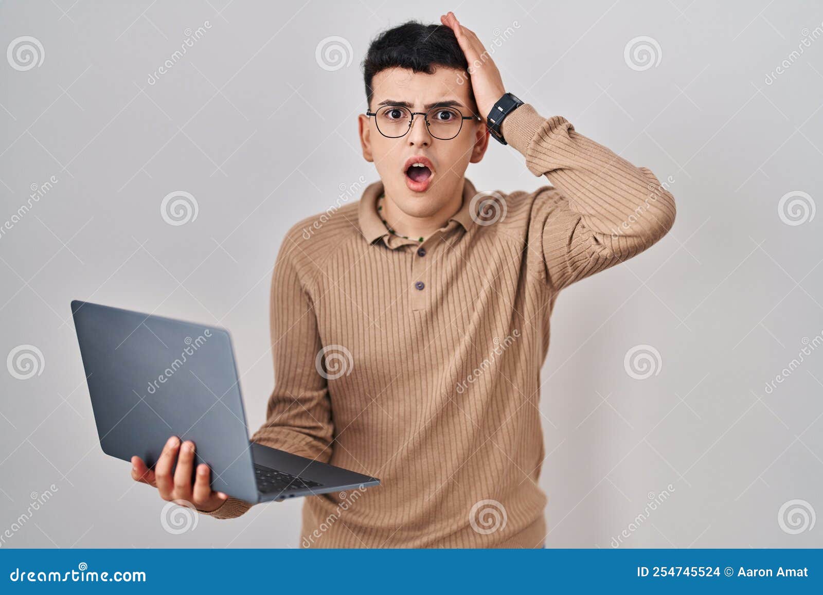 Non Binary Person Using Computer Laptop Crazy and Scared with Hands on ...