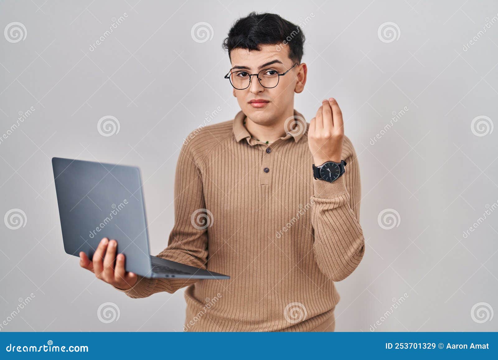 Non Binary Person Using Computer Laptop Doing Italian Gesture with Hand ...