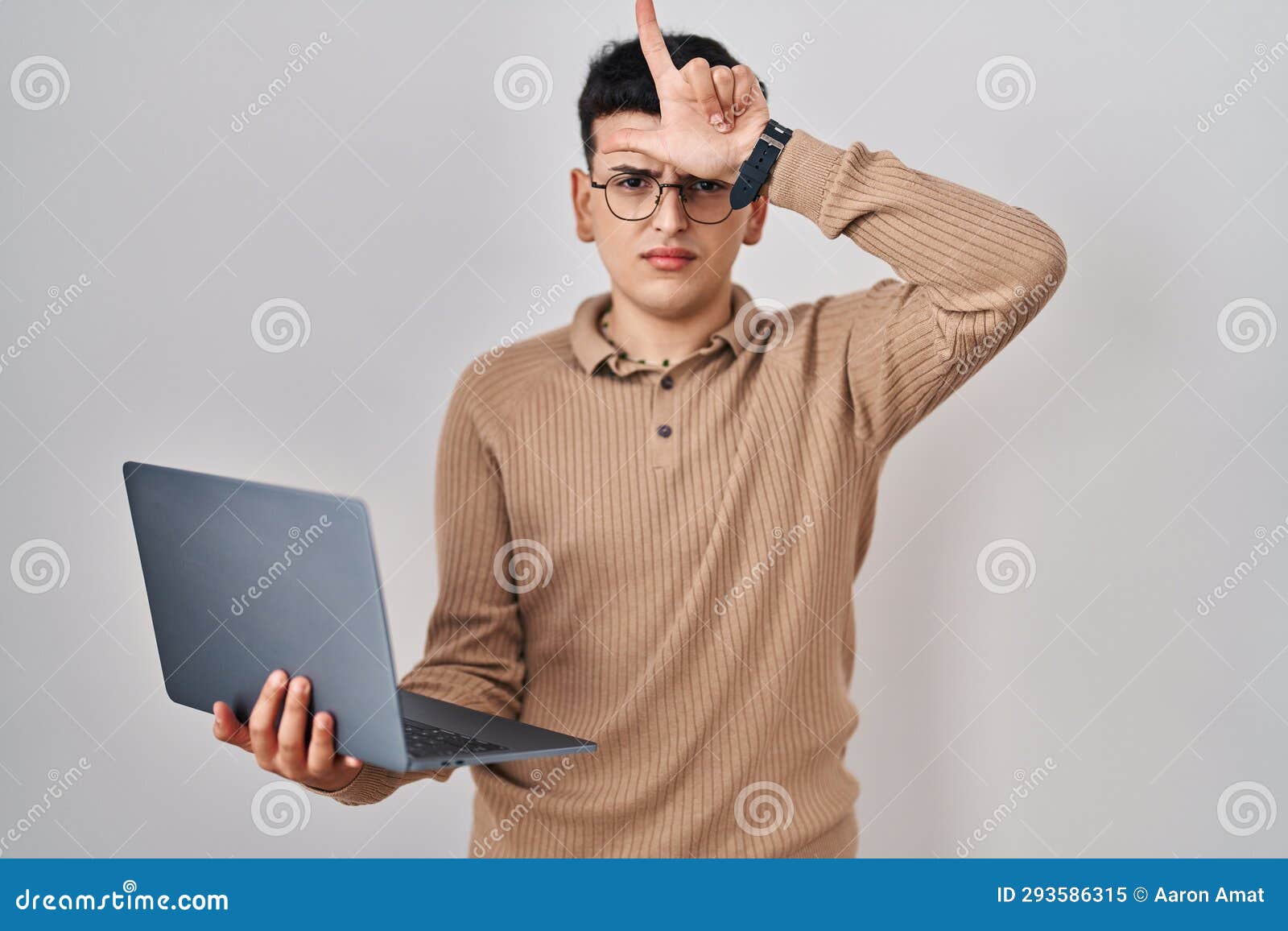 Non Binary Person Using Computer Laptop Making Fun of People with ...