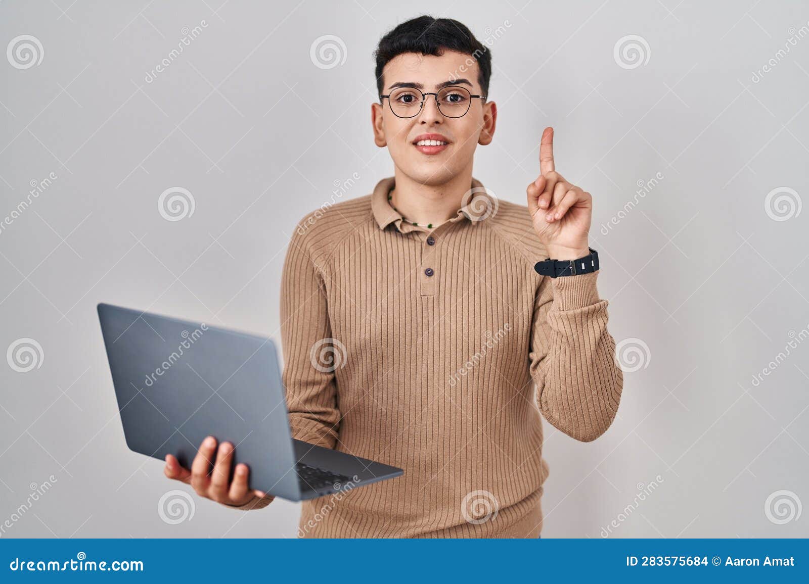 Non Binary Person Using Computer Laptop Pointing Finger Up with ...