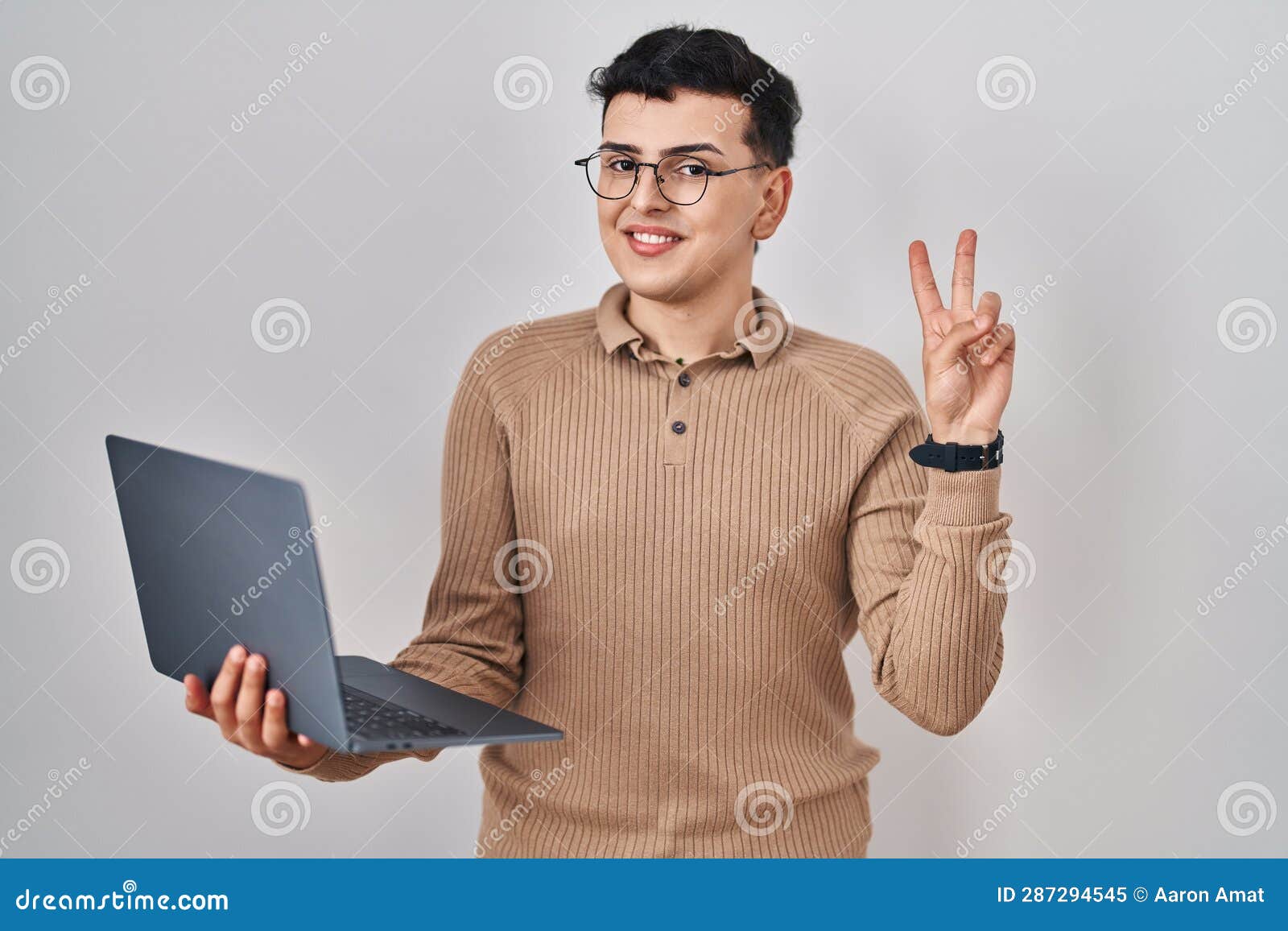Non Binary Person Using Computer Laptop Smiling with Happy Face Winking ...