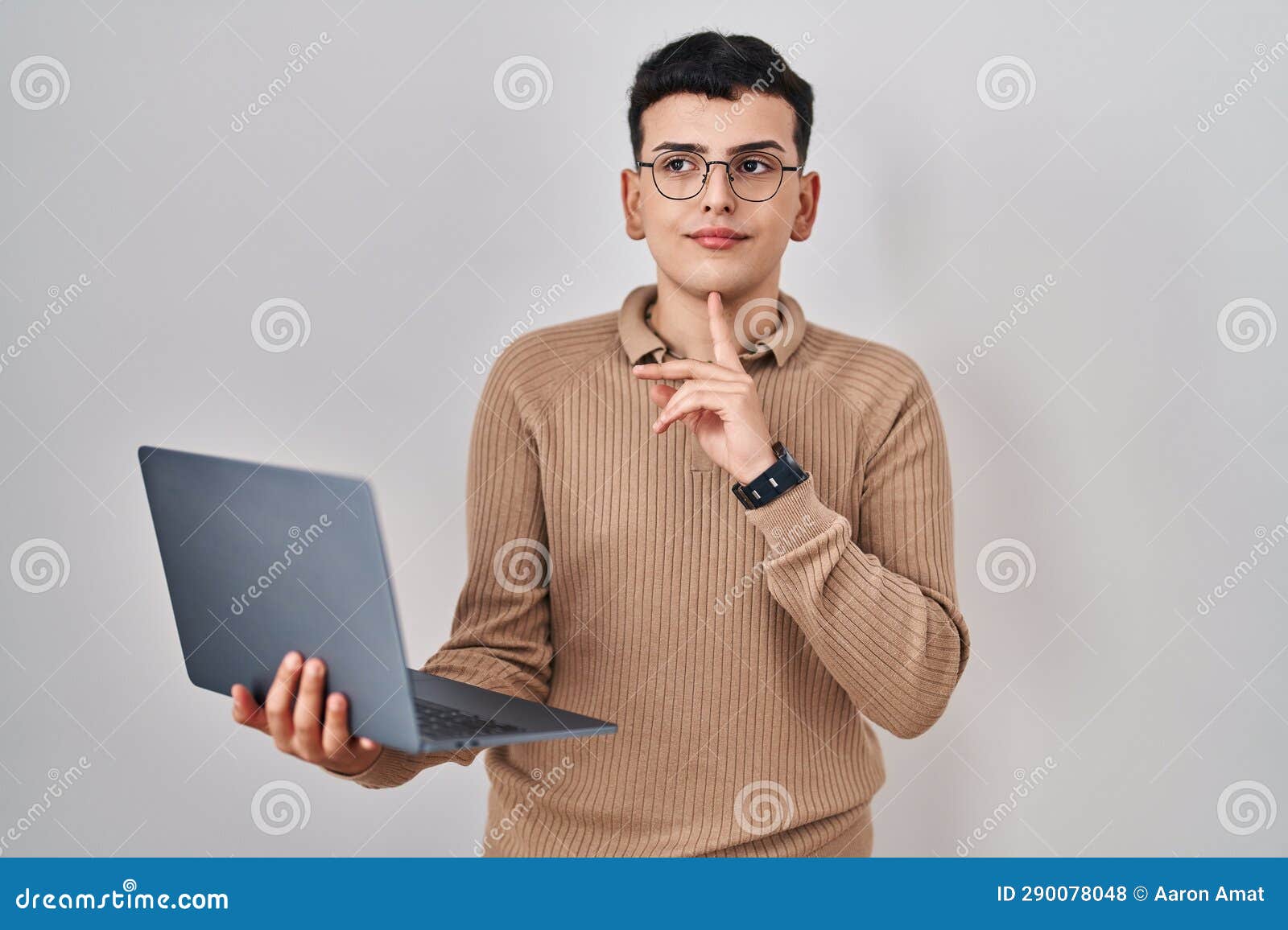 Non Binary Person Using Computer Laptop Thinking Concentrated about ...