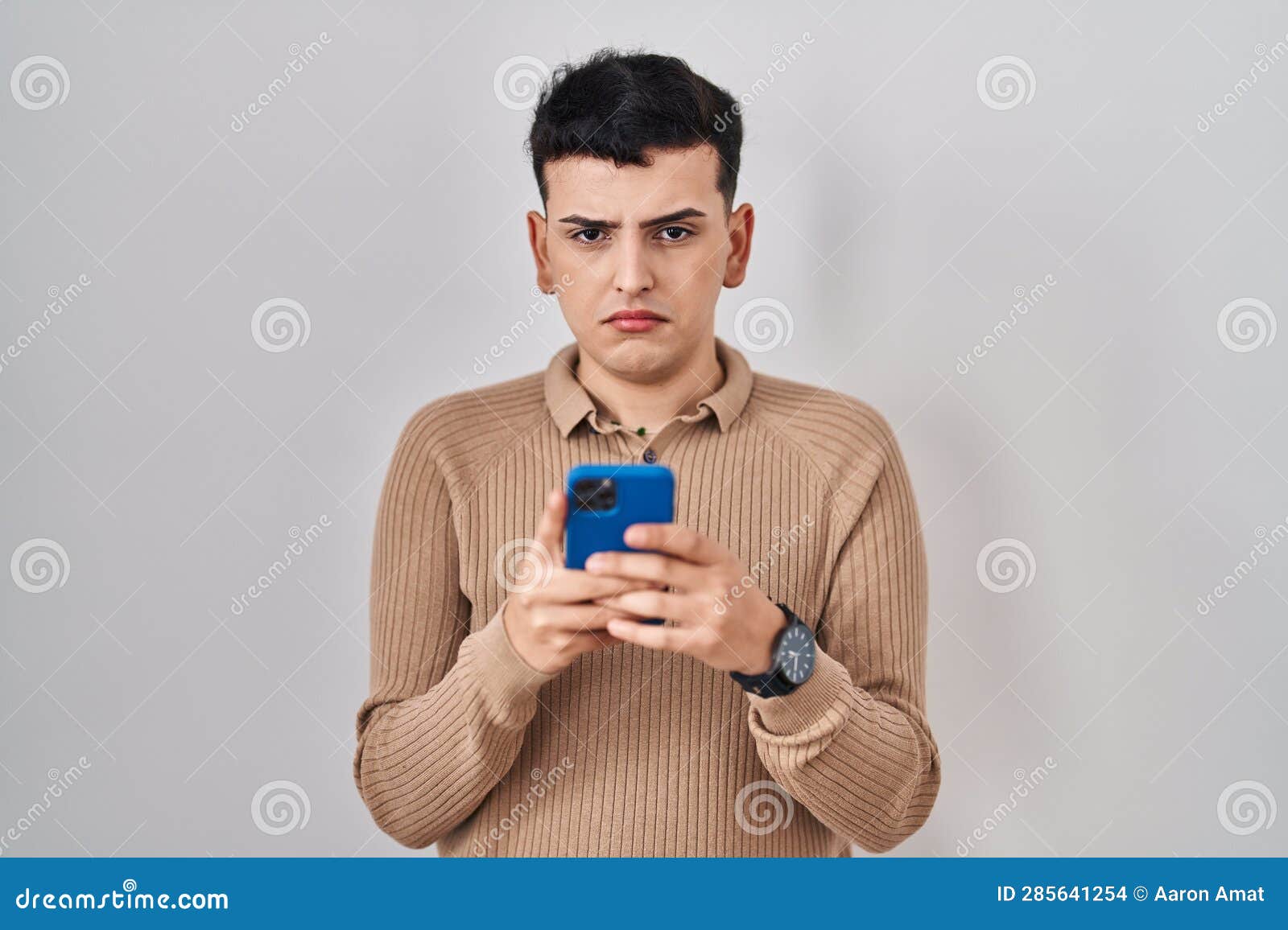 Non Binary Person Using Smartphone Typing Message Depressed and Worry ...