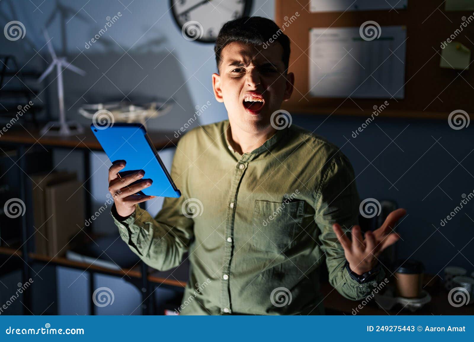 Non Binary Person Using Touchpad Device at Night Angry and Mad ...