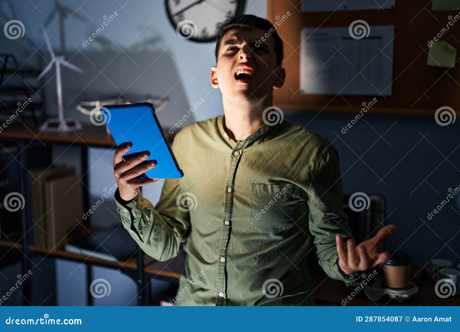 Non Binary Person Using Touchpad Device at Night Angry and Mad ...