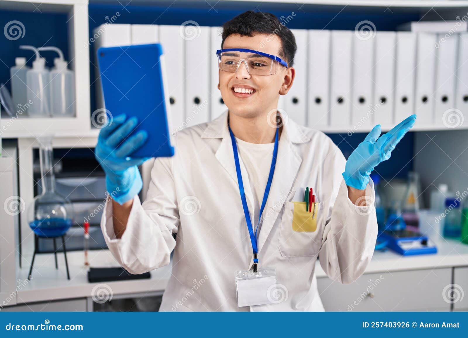 Non Binary Person Working at Scientist Laboratory Using Tablet ...