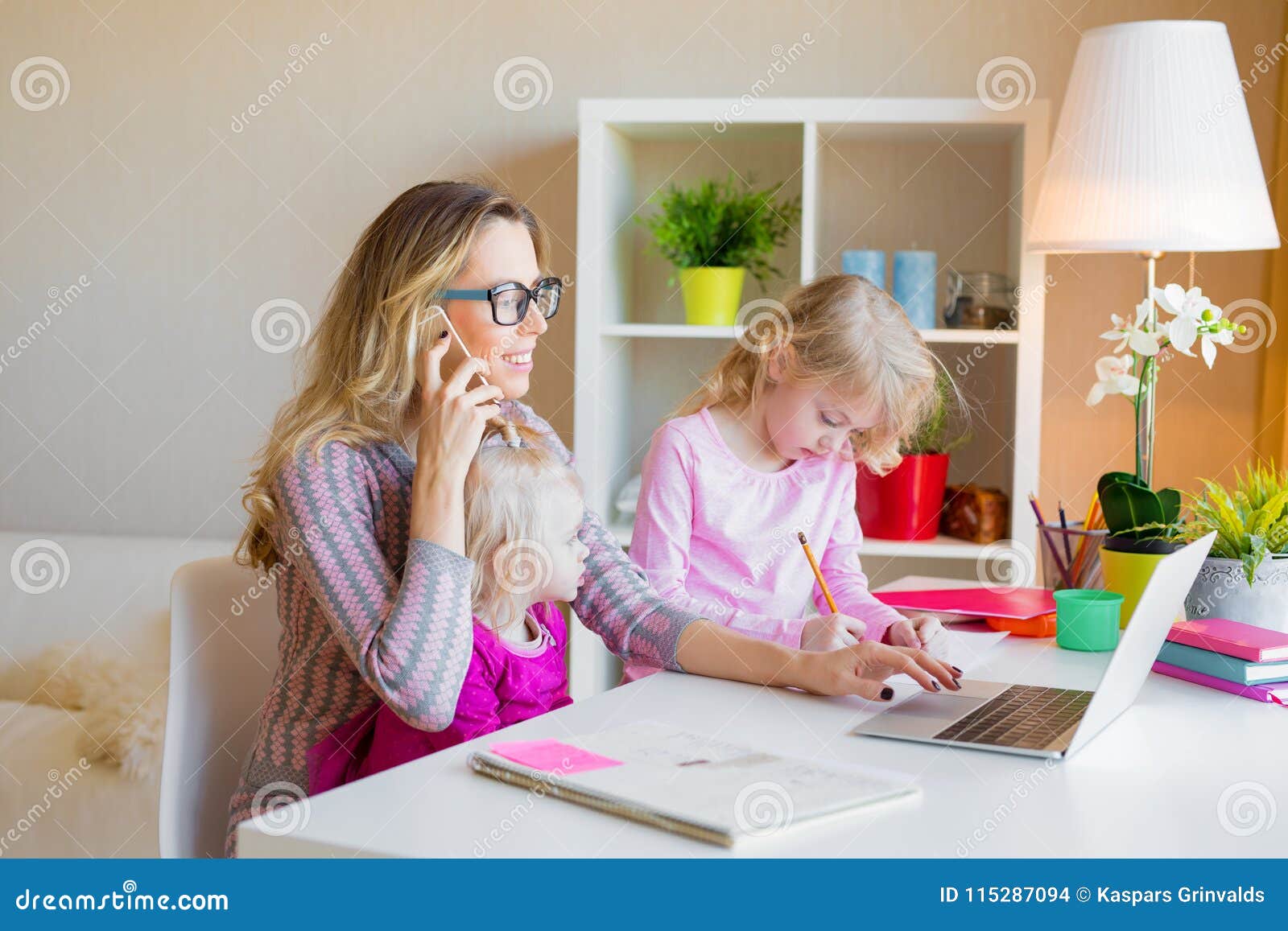 Mom with Two Daughters Working from Home Stock Photo - Image of manager ...