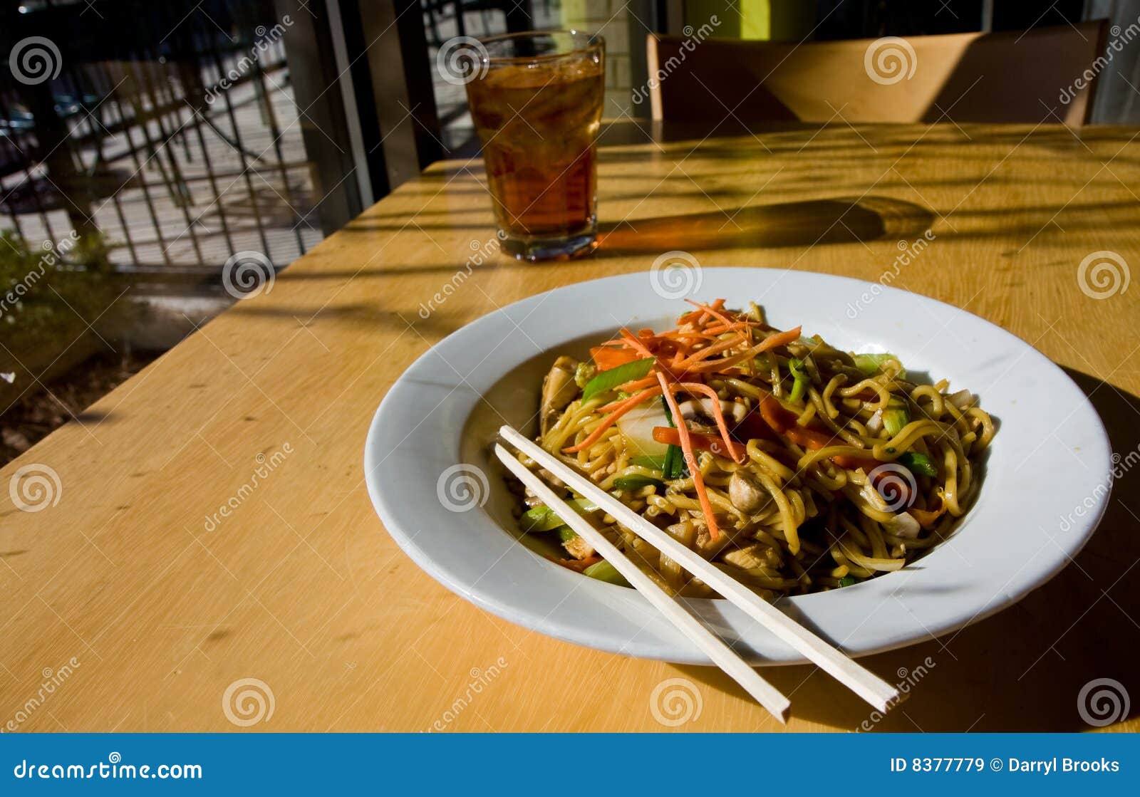 Noodle Dish and Iced Tea stock image. Image of dish, vegetable - 8377779