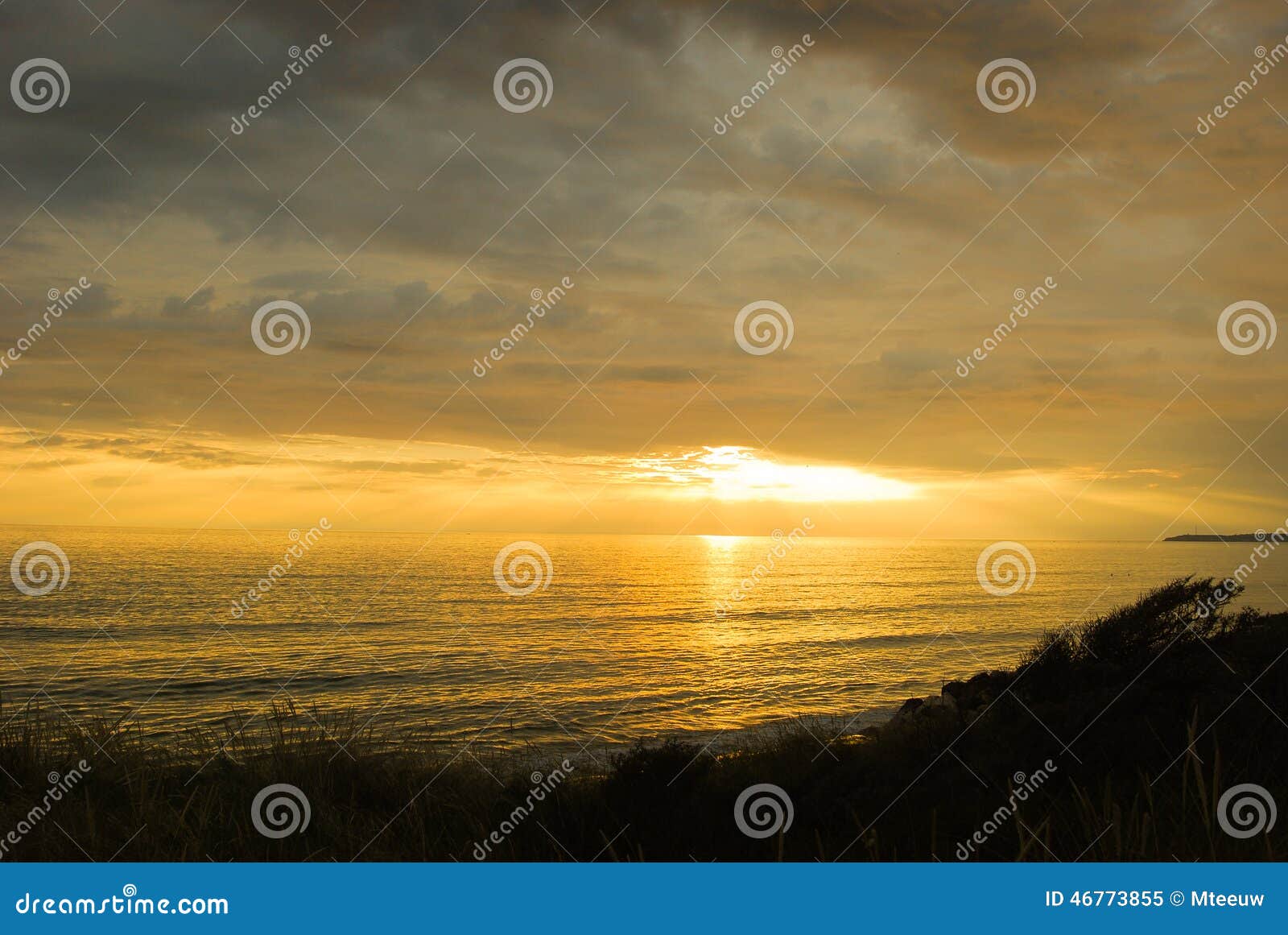 Normandy beach with sunset stock image. Image of sign - 46773855
