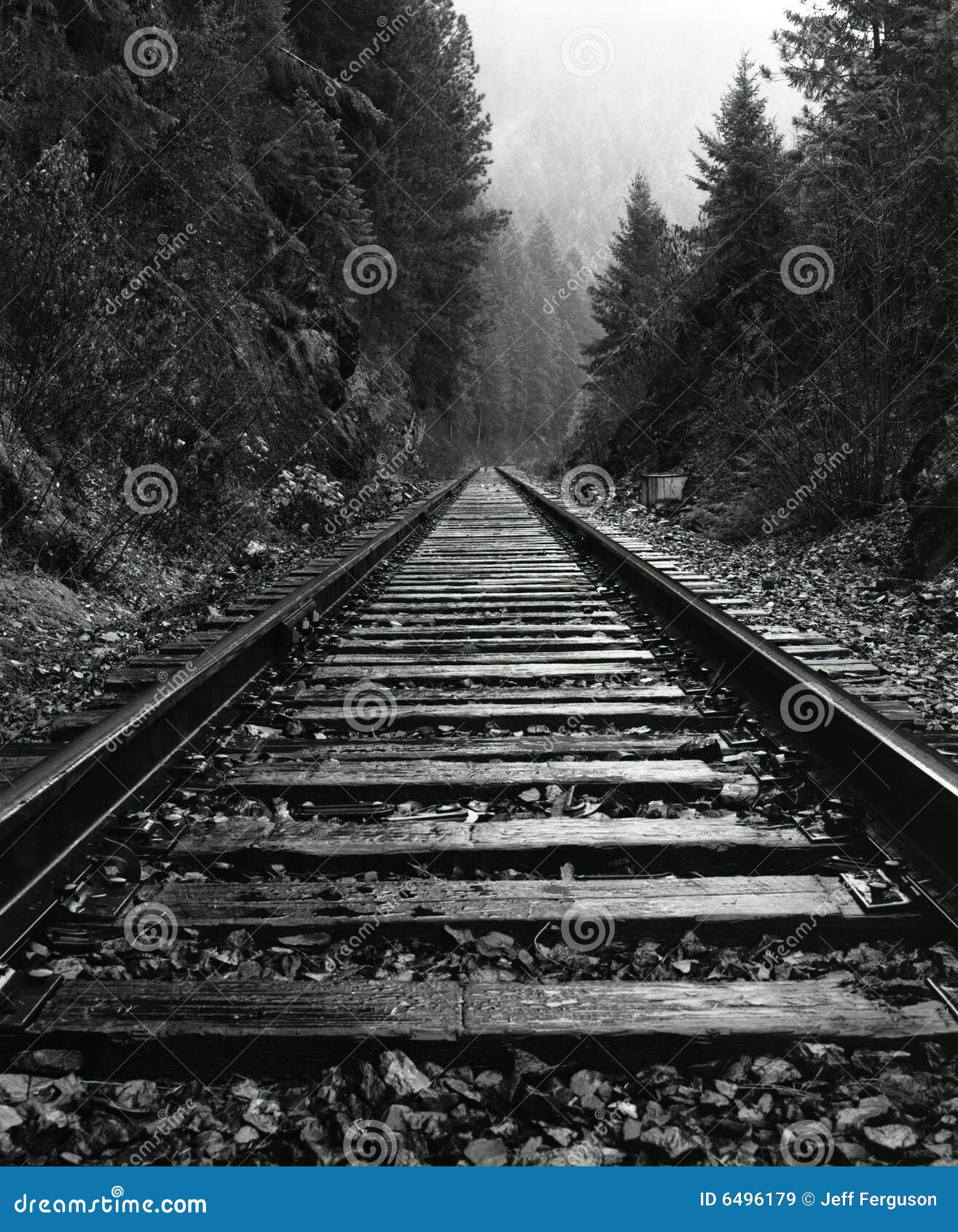 Train Tracks. Narrow-gauge Line Under Cloudy Sky On The Sunset Royalty ...