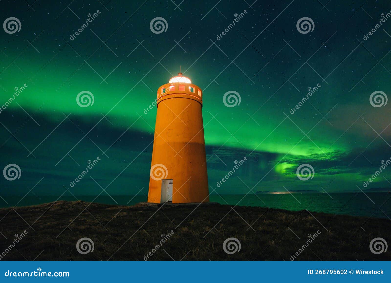 Northern Lights Aurora Borealis Over Lighthouse in Iceland Stock Photo ...