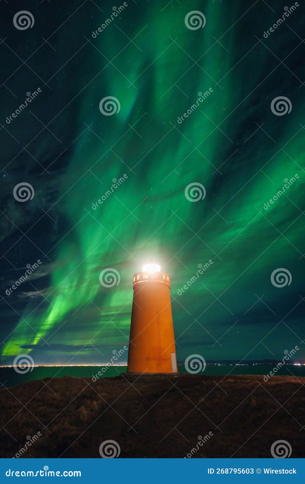 Northern Lights Aurora Borealis Over Lighthouse in Iceland Stock Image ...