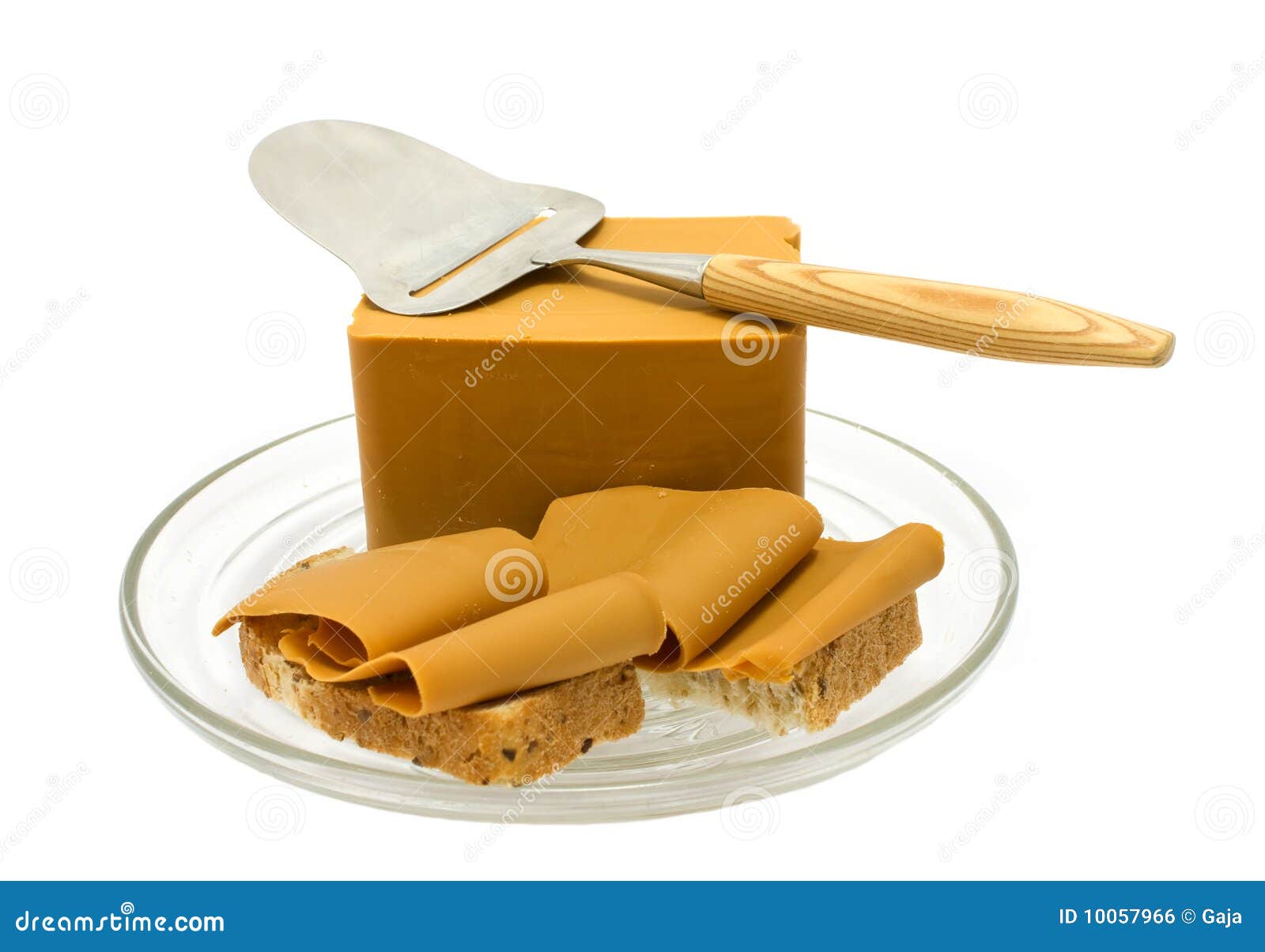 Norwegian Brown Cheese and Cheese Cutter Stock Photo - Image of slice ...