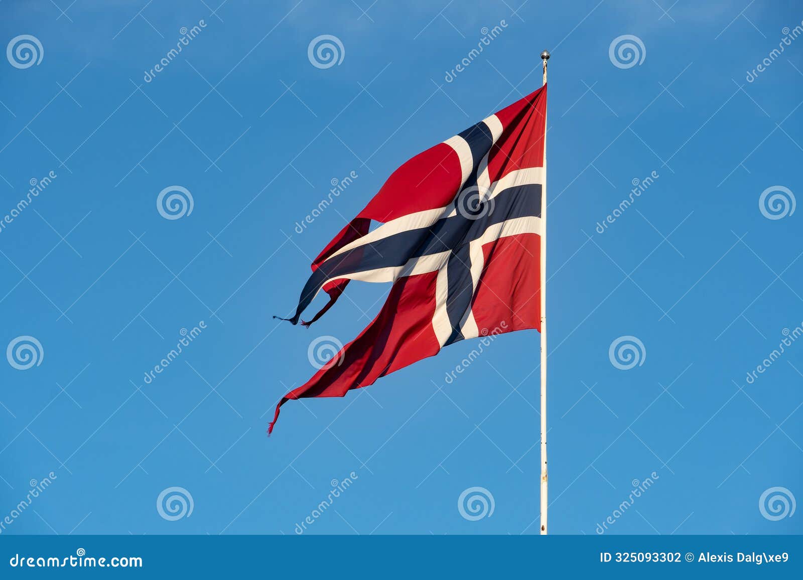 Norwegian Flag with Blue Sky and Clouds Stock Photo - Image of flying ...