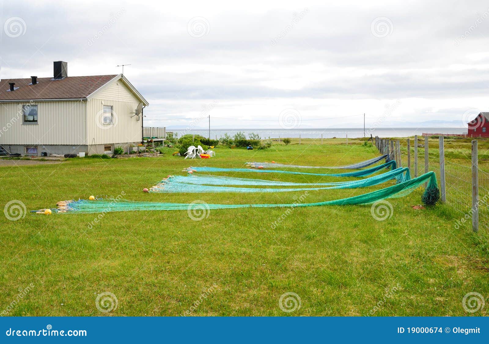 Norwegian Yard with Small House and Fishing Nets. Stock Photo - Image ...