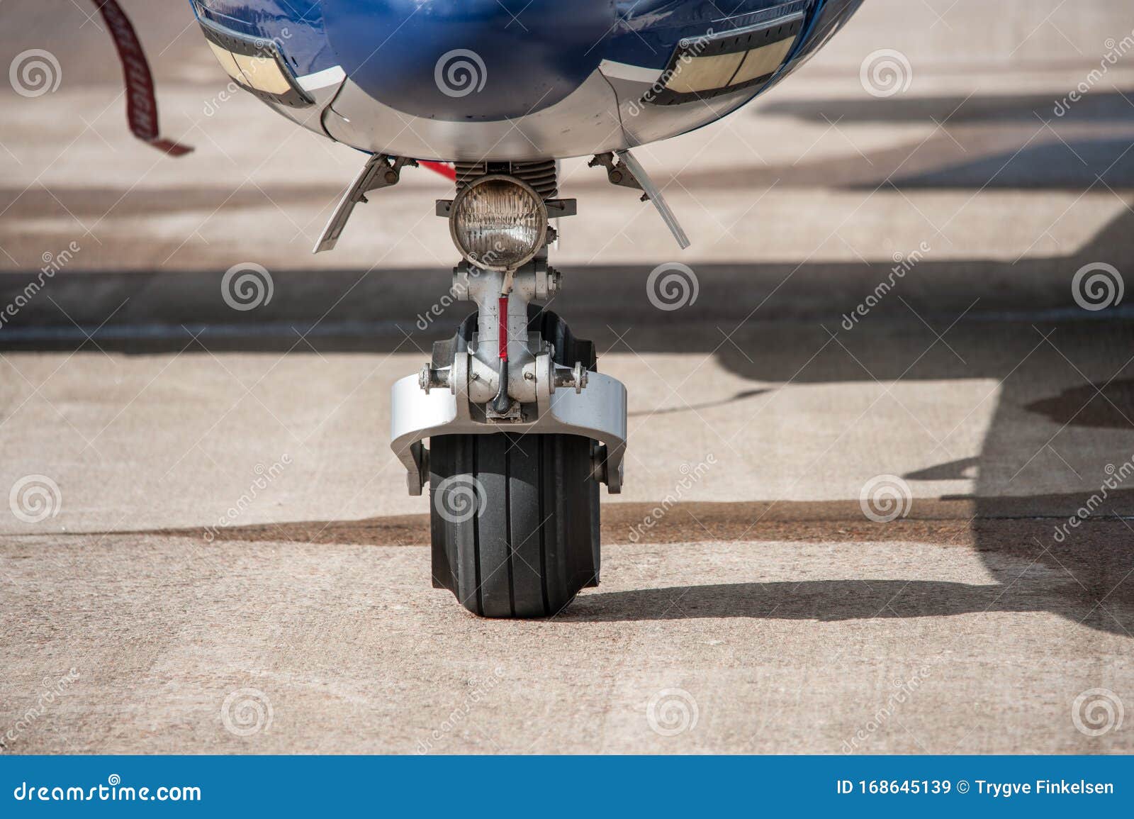 Nose wheel of an aircraft stock image. Image of flying - 168645139