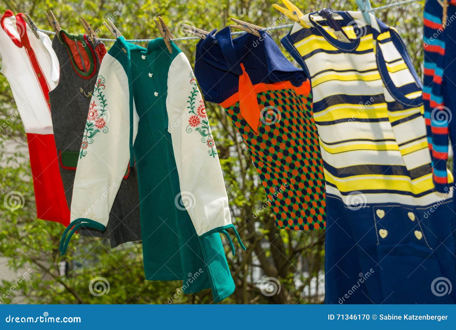 Nostalgic Kids Clothes on the Line Stock Photo - Image of colored ...