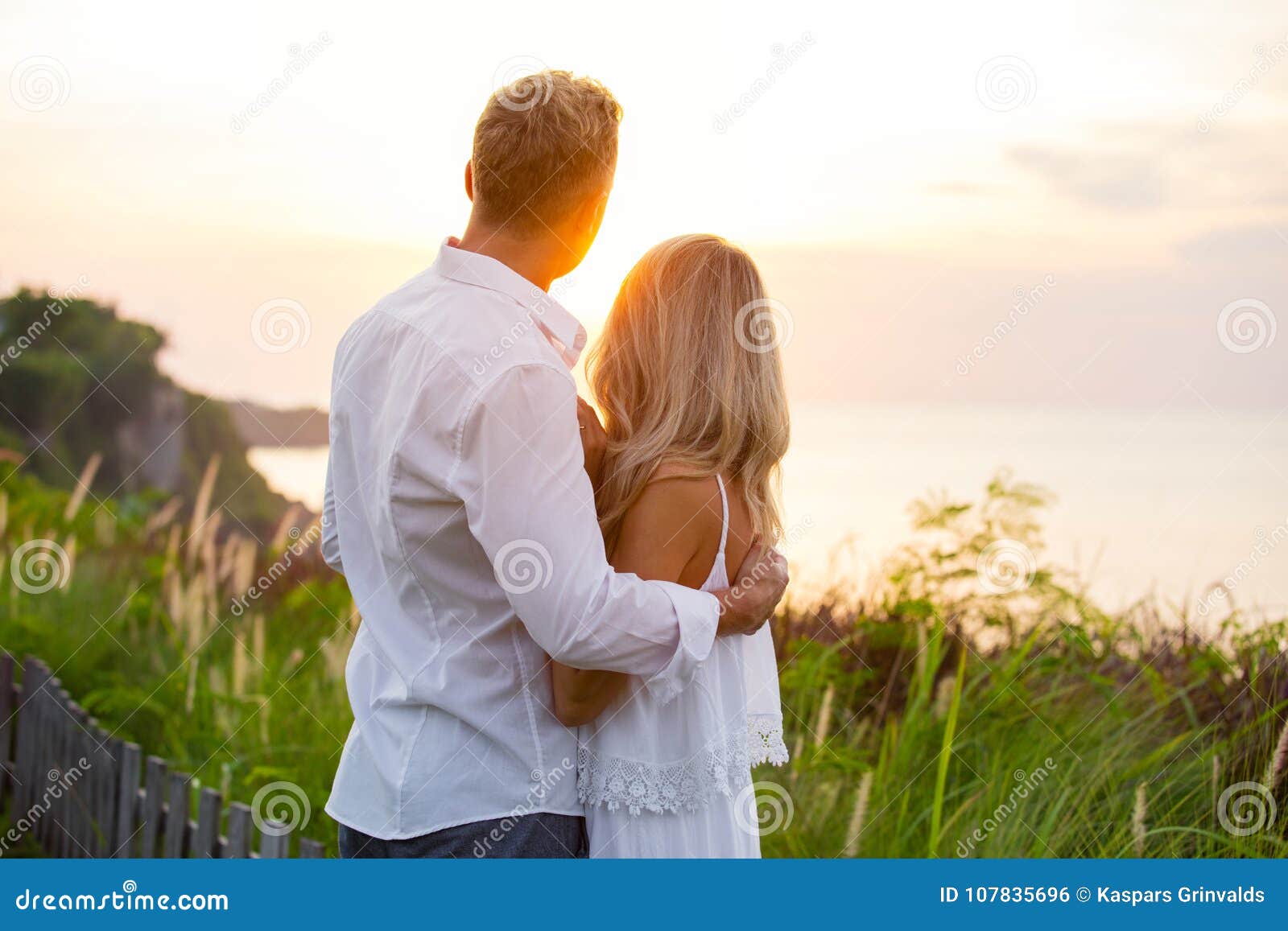 Nostalgic and Romantic Couple Looking at Sunset Stock Photo - Image of ...