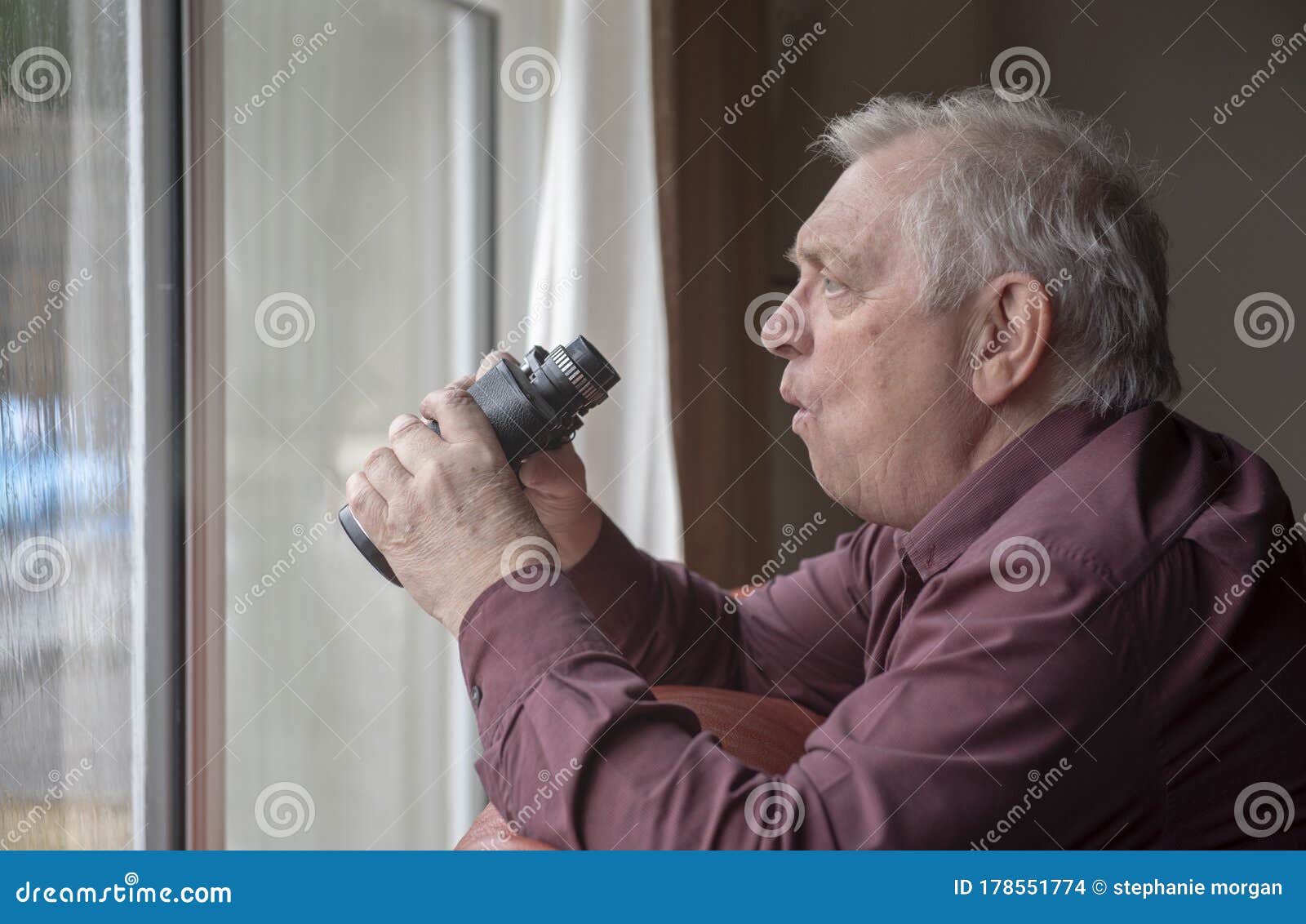 Nosy Neighbor Looking Out of Window with Binoculars Stock Photo - Image ...