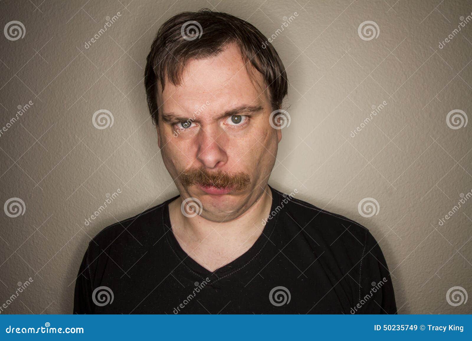 Not impressed stock image. Image of casual, male, frustrated - 50235749