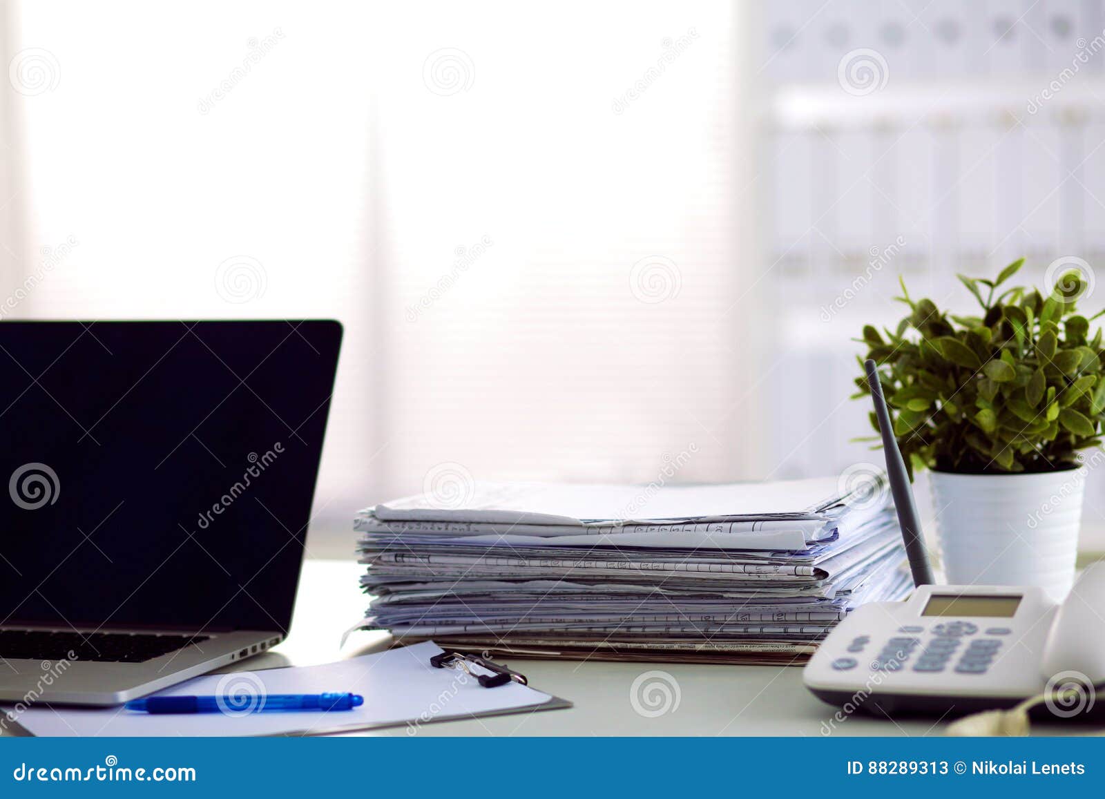 A Note Book, Laptop, Pen, Graph Paper Document on the Office Desk Table ...