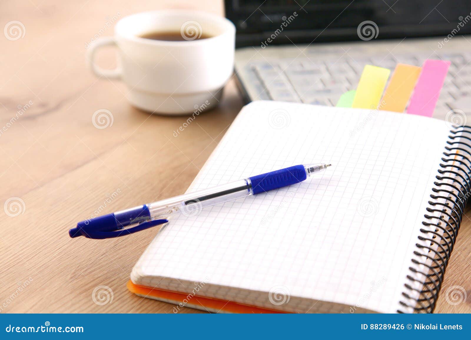 A Note Book, Laptop, Pen, Graph Paper Document on the Office Desk Table ...