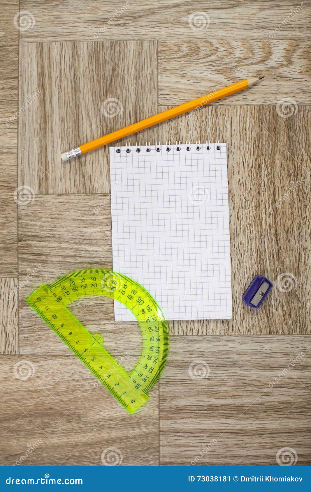 Note Book, Pencil and Protractor Ruler on a Wooden Texture Stock Image ...