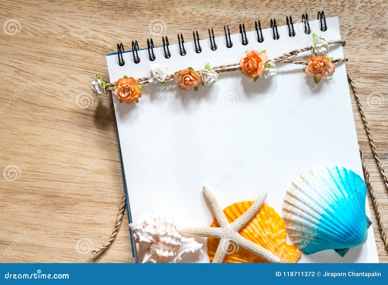 Note Book with Shell and Paper Roses on Wood Background Stock Photo ...
