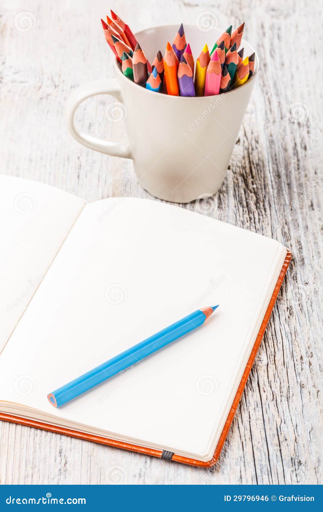 Note and color pencils stock photo. Image of paper, green - 29796946