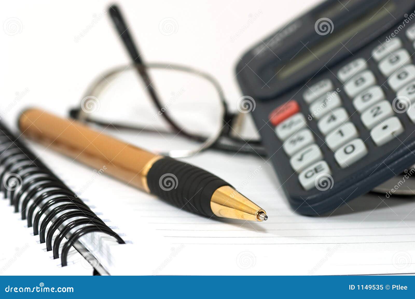 Note Pad with Pen, Calculator, and Glasses. Stock Image - Image of ...