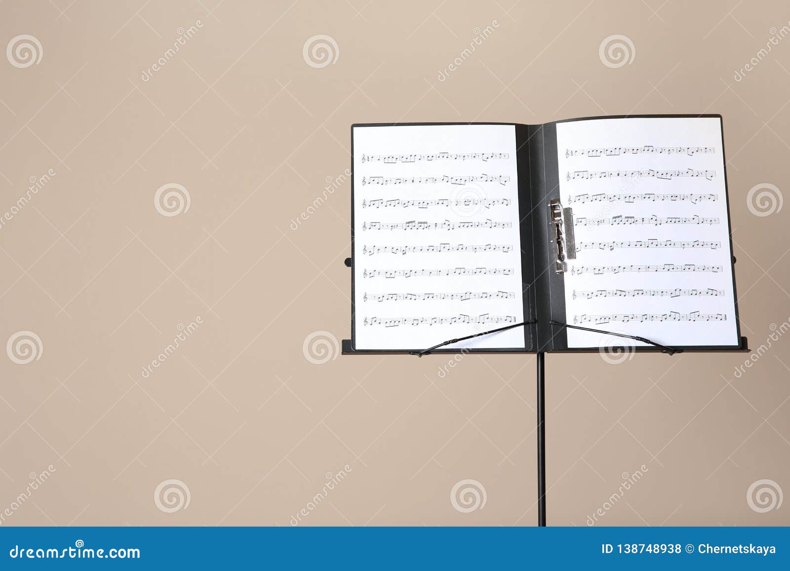 Note Stand with Music Sheets on Color Background. Stock Photo - Image ...