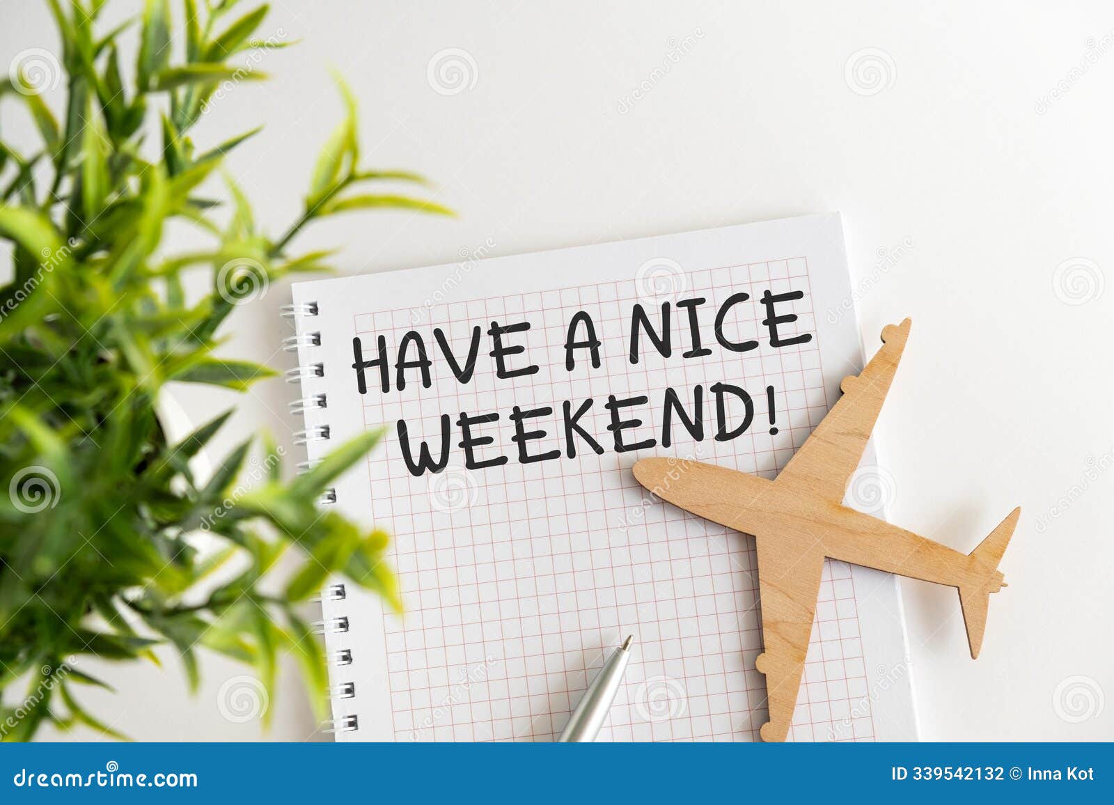 Note Writing Happy Weekend on Notebook with a Handle and an Airplane ...