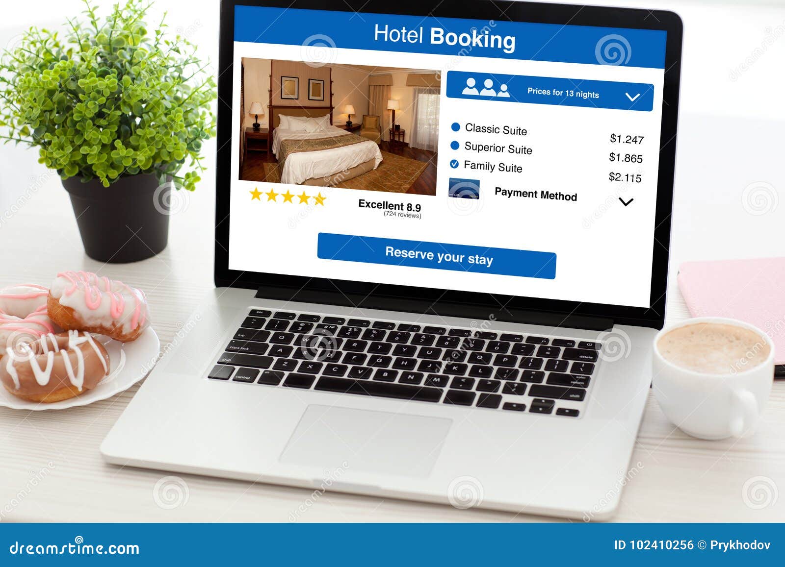 Notebook with App Hotel Booking Screen on Desk in Office Stock Photo ...