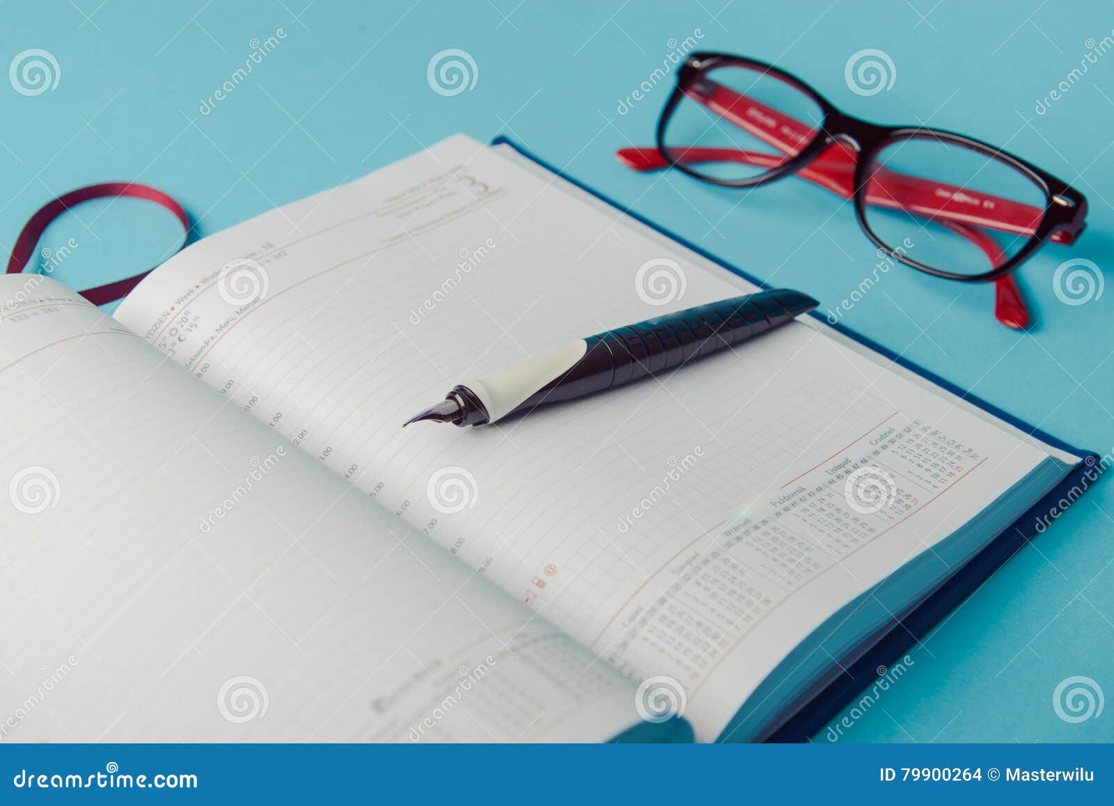 Notebook on Blue Paper. Open Diary and Pen To Record Stock Photo ...