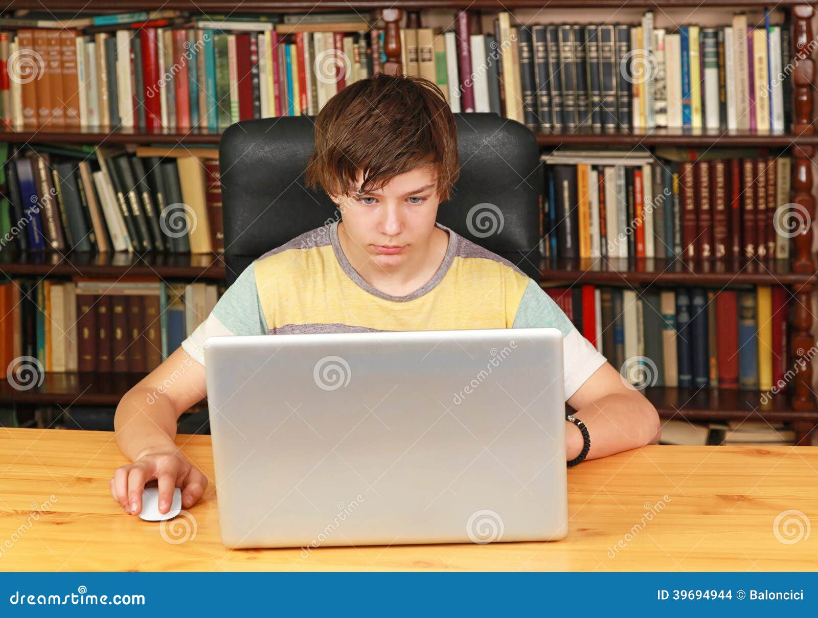Notebook boy stock photo. Image of teenager, library - 39694944