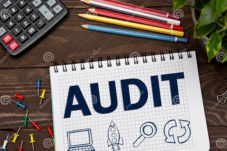 Notebook with a Business Notes AUDIT on the Office Table with Tools ...