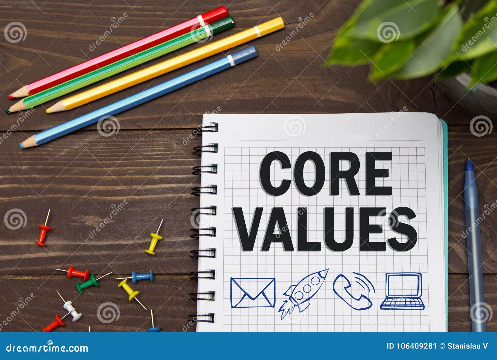 Notebook with a Business Notes CORE VALUES on the Office Table with ...