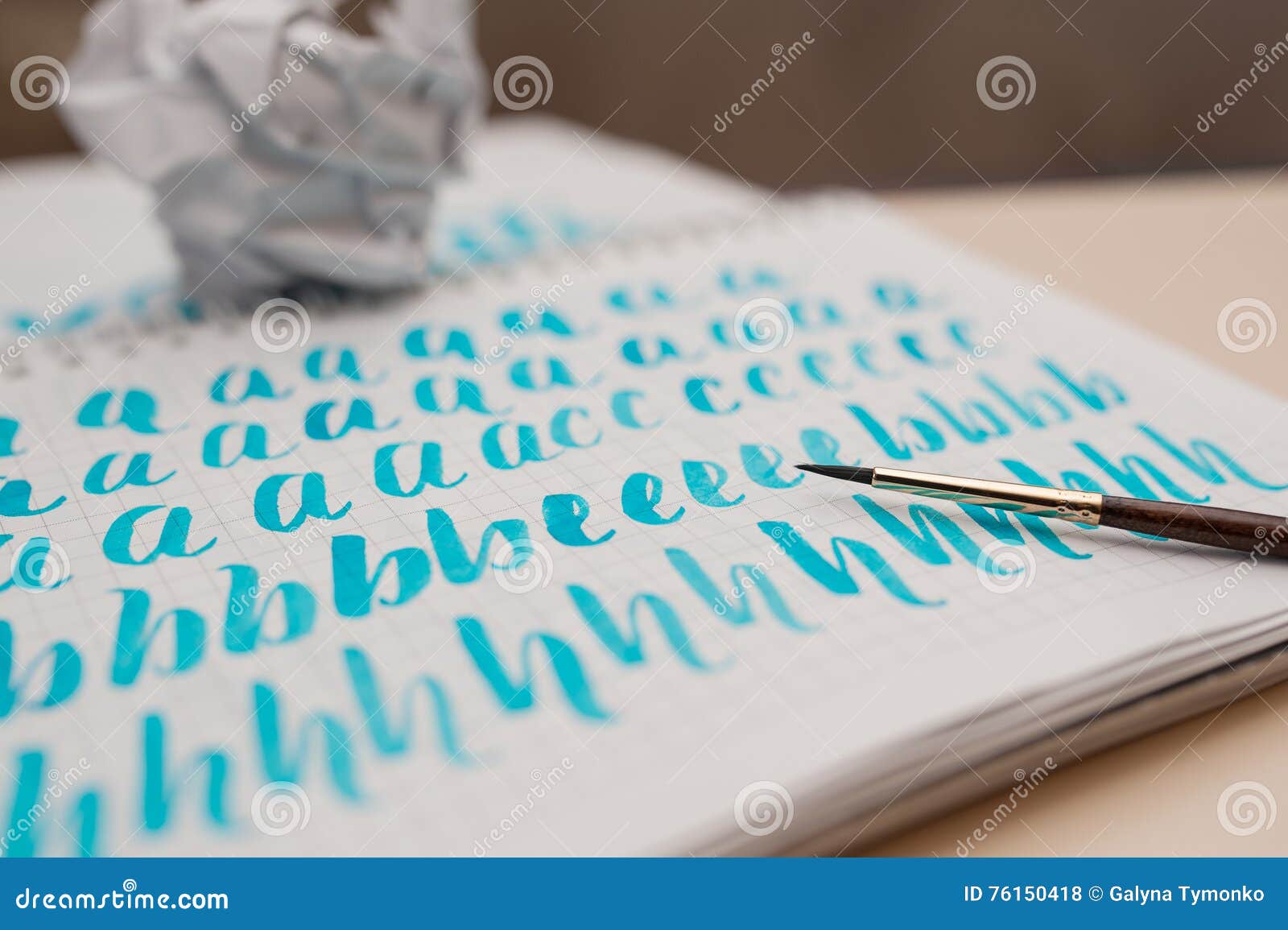 Notebook with Calligraphy Lettering and Brush Stock Photo - Image of ...