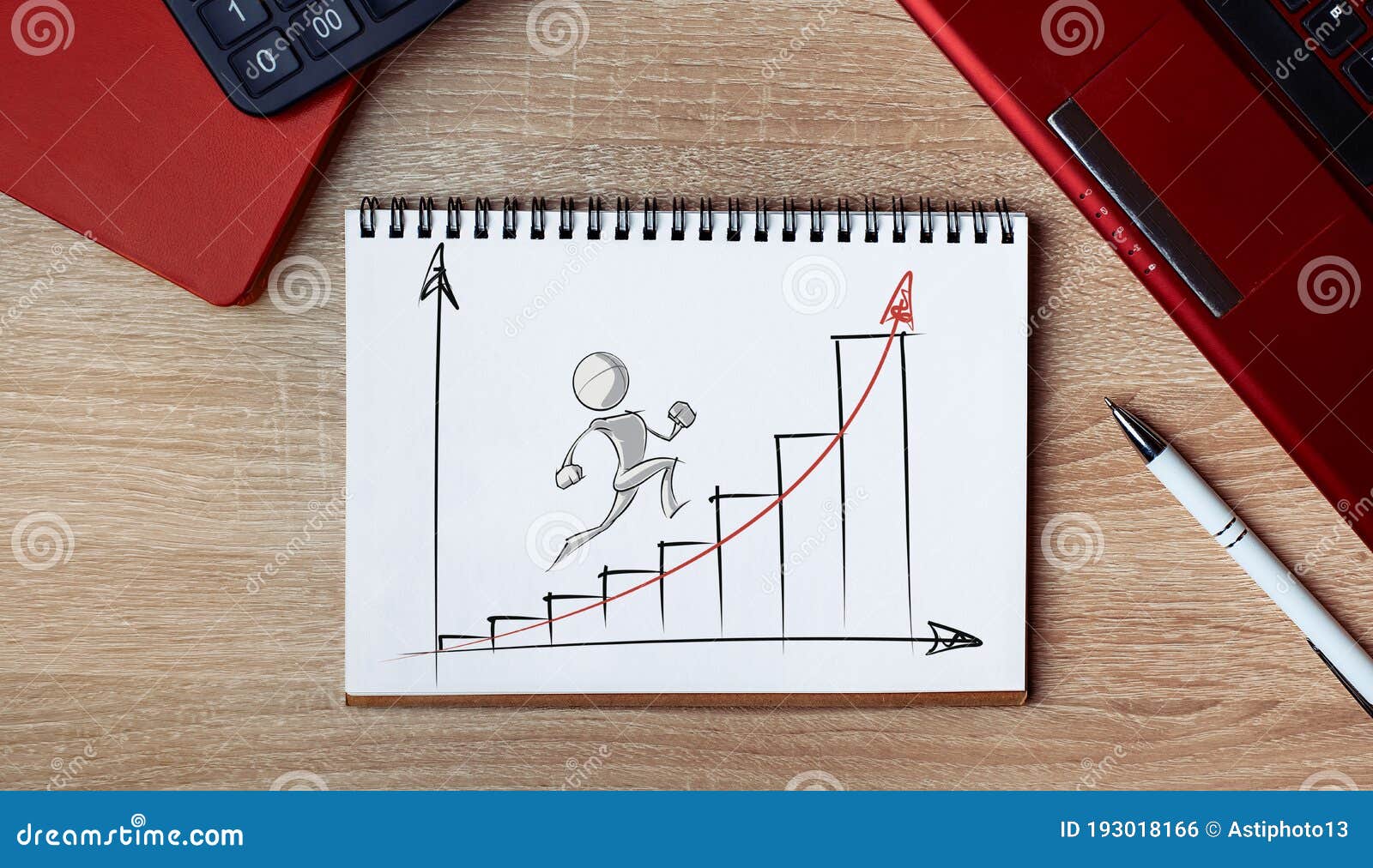 Notebook with Chart Growth of Profits. Notebook on Desk with Laptop and ...