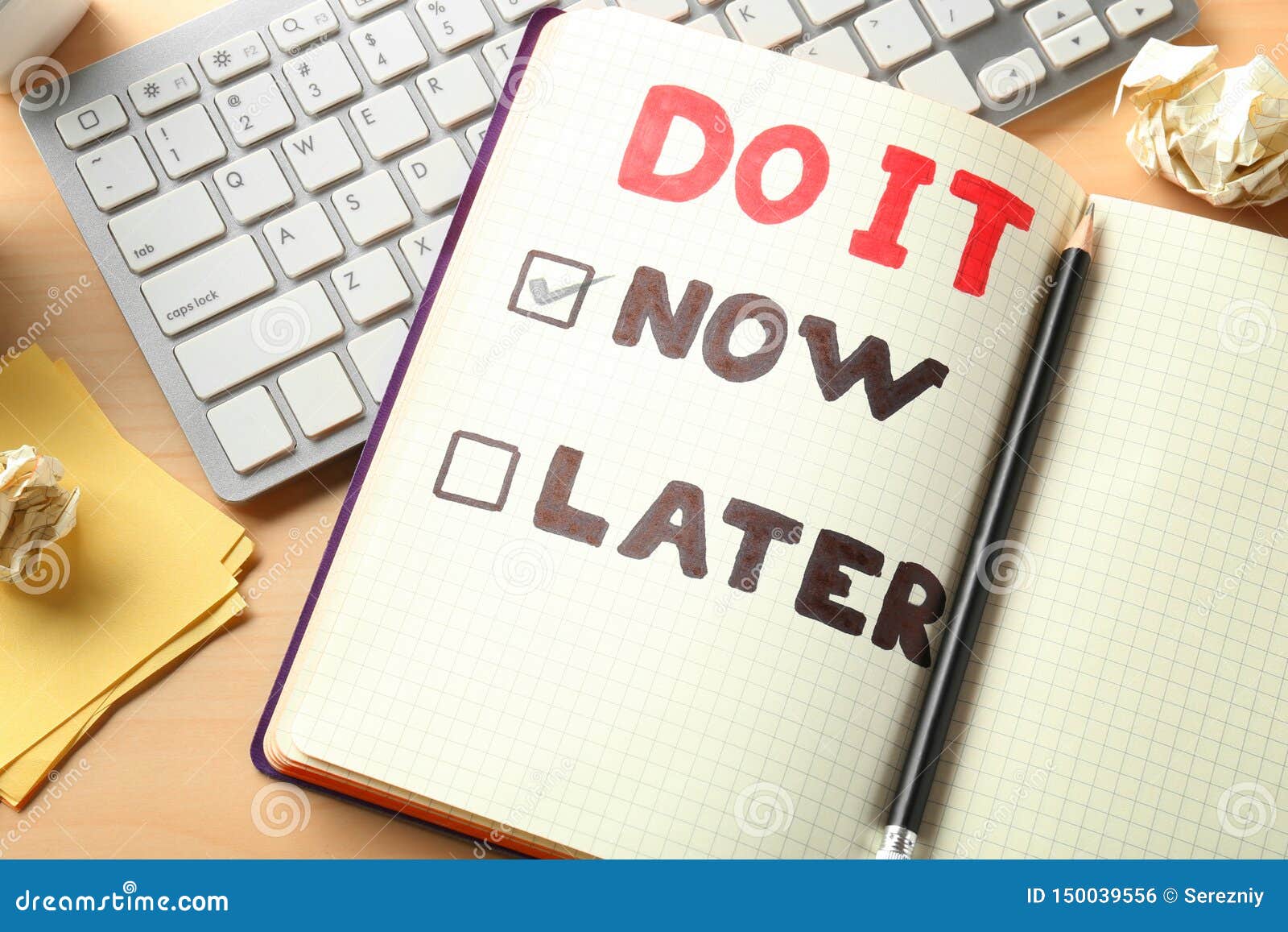 Notebook with Choice DO it NOW or LATER and Keyboard on Table Stock ...