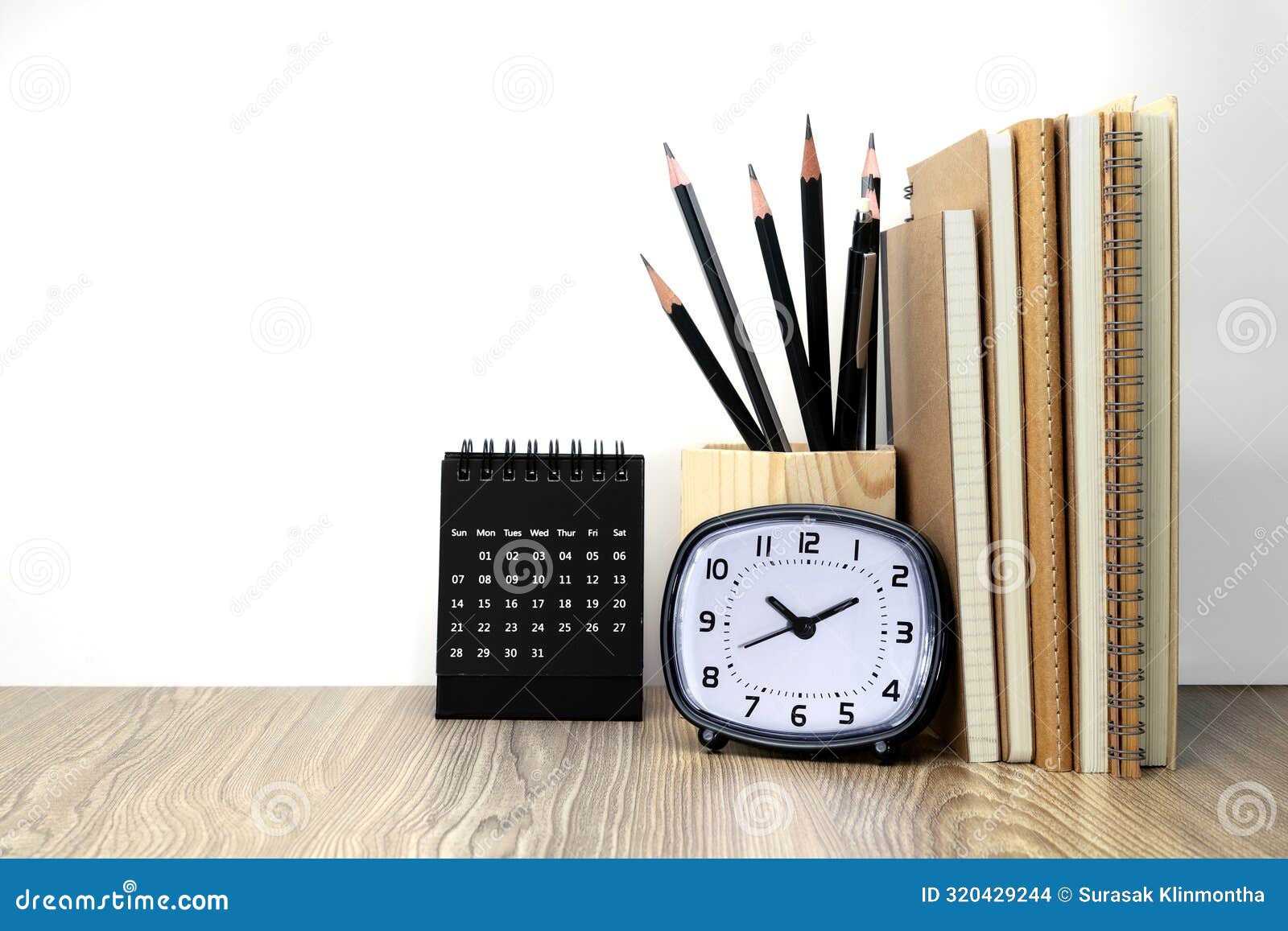 Notebook and Clock and Calendar on Table. Work Desk Space Stock Photo ...