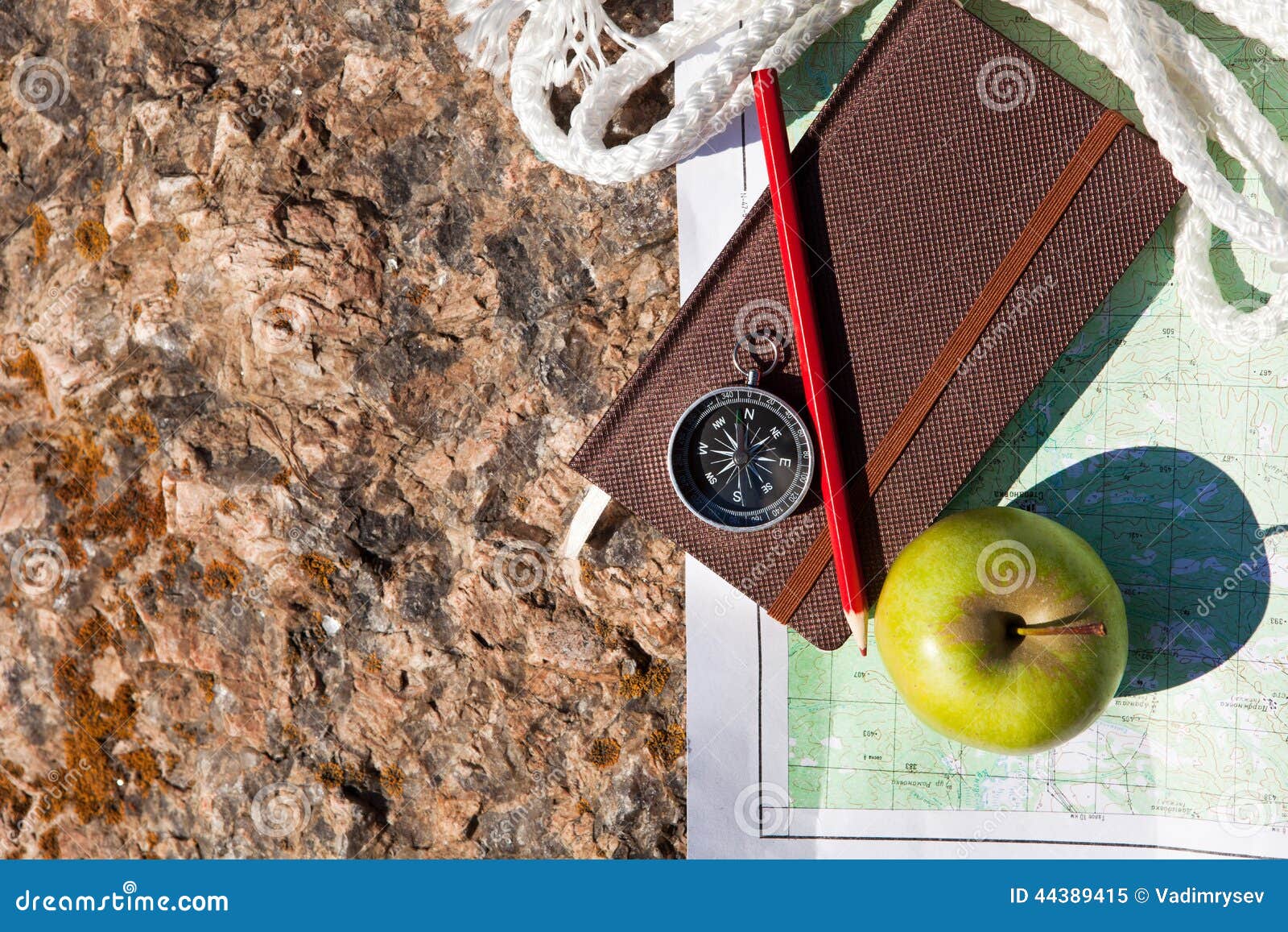 Notebook, Compass, Apple, Rope on Stone Background Stock Image - Image ...