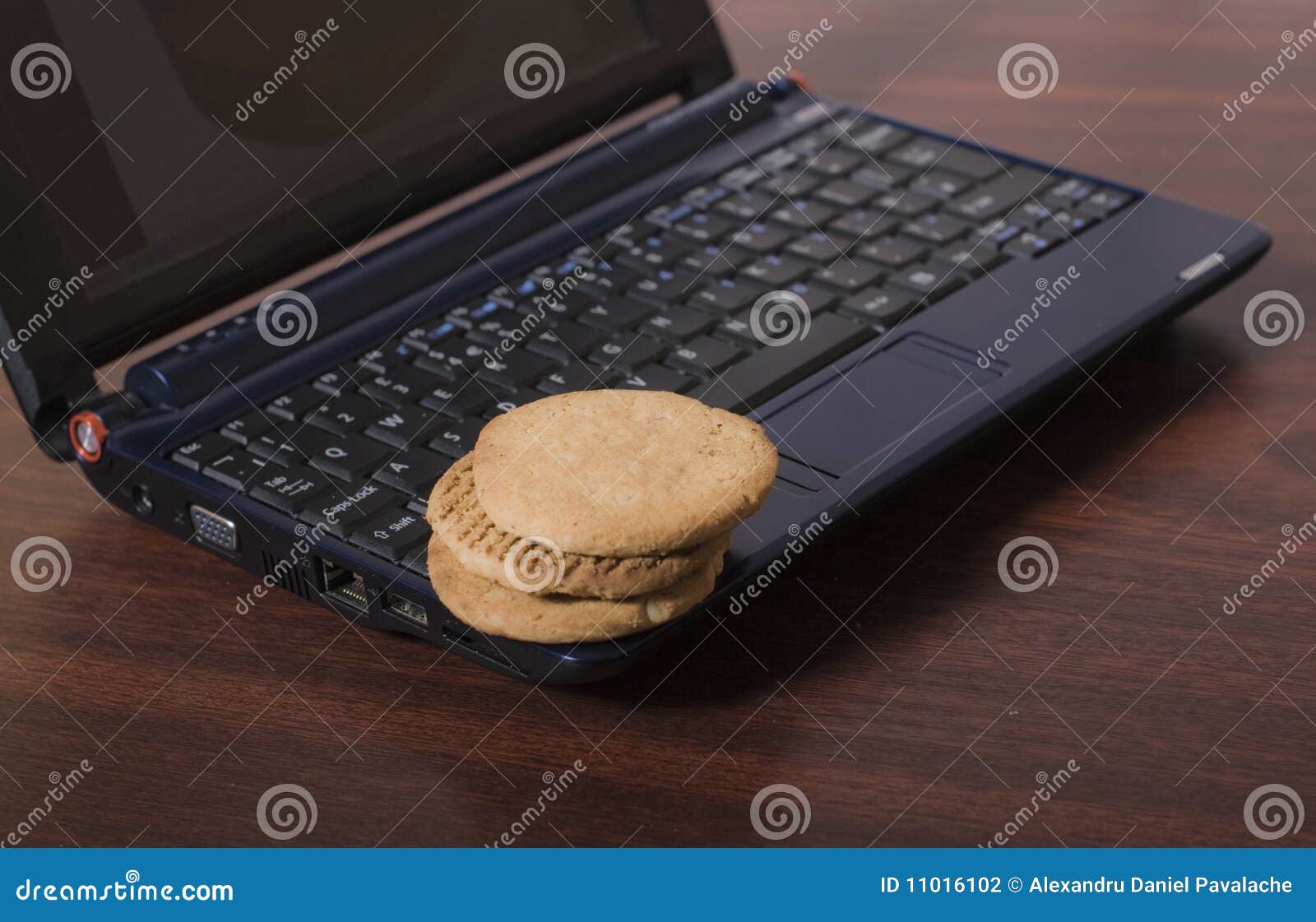 Notebook and cookies stock photo. Image of circuit, electronics - 11016102