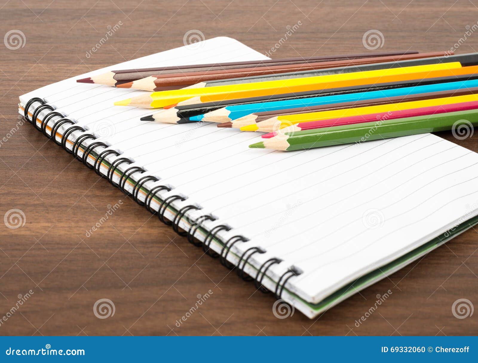 Notebook with crayons stock photo. Image of white, yellow - 69332060