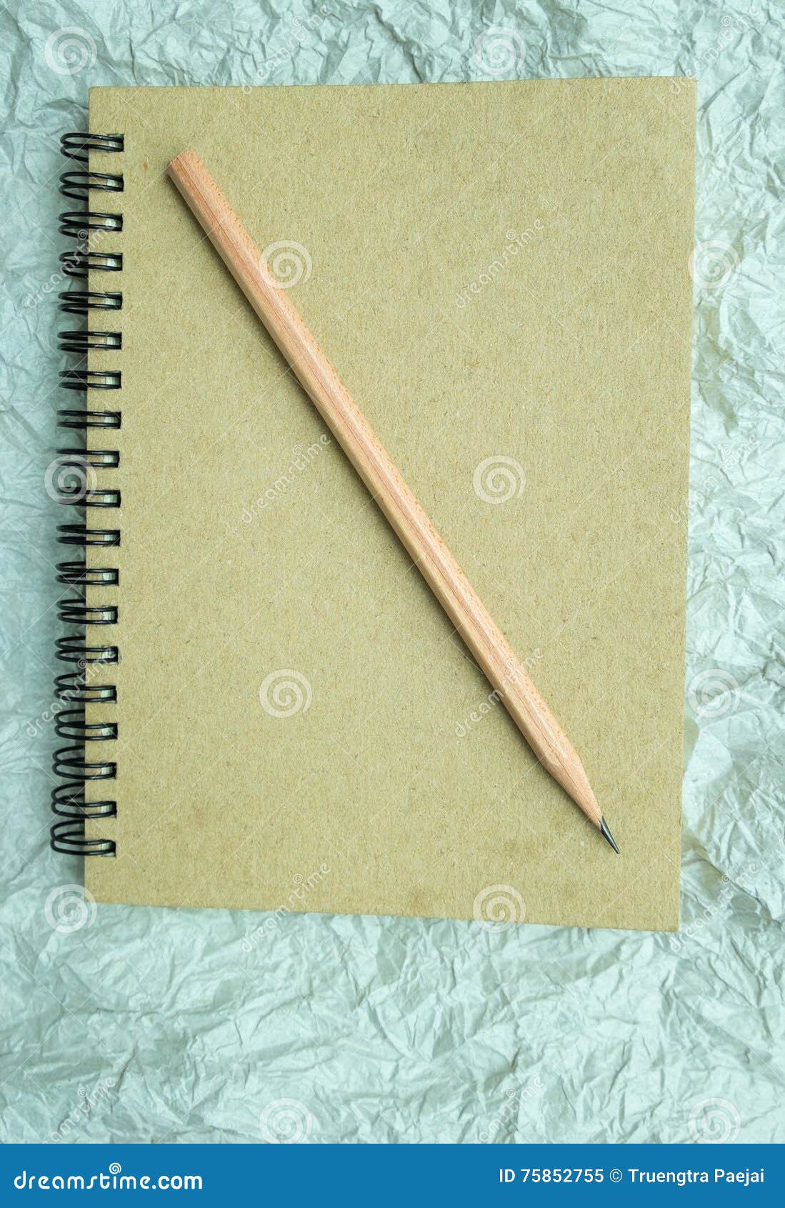 Notebook on crumpled paper stock image. Image of sheet - 75852755