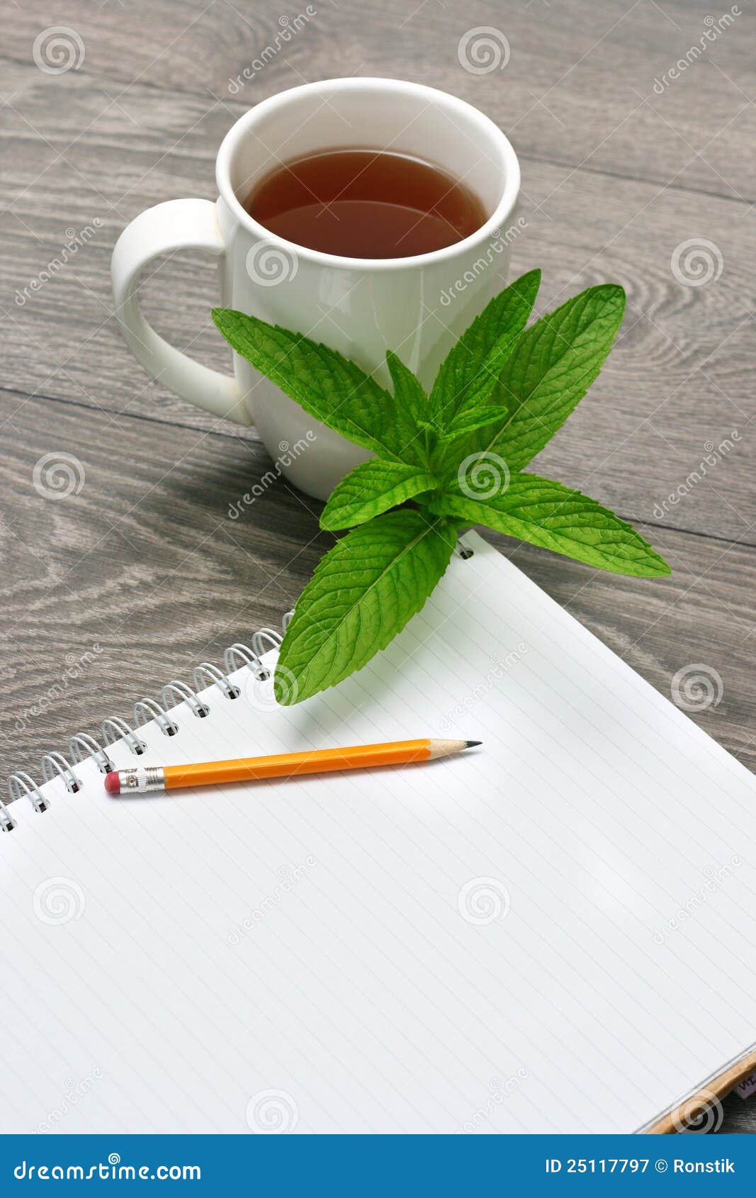Notebook and cup of tea stock image. Image of leisure - 25117797