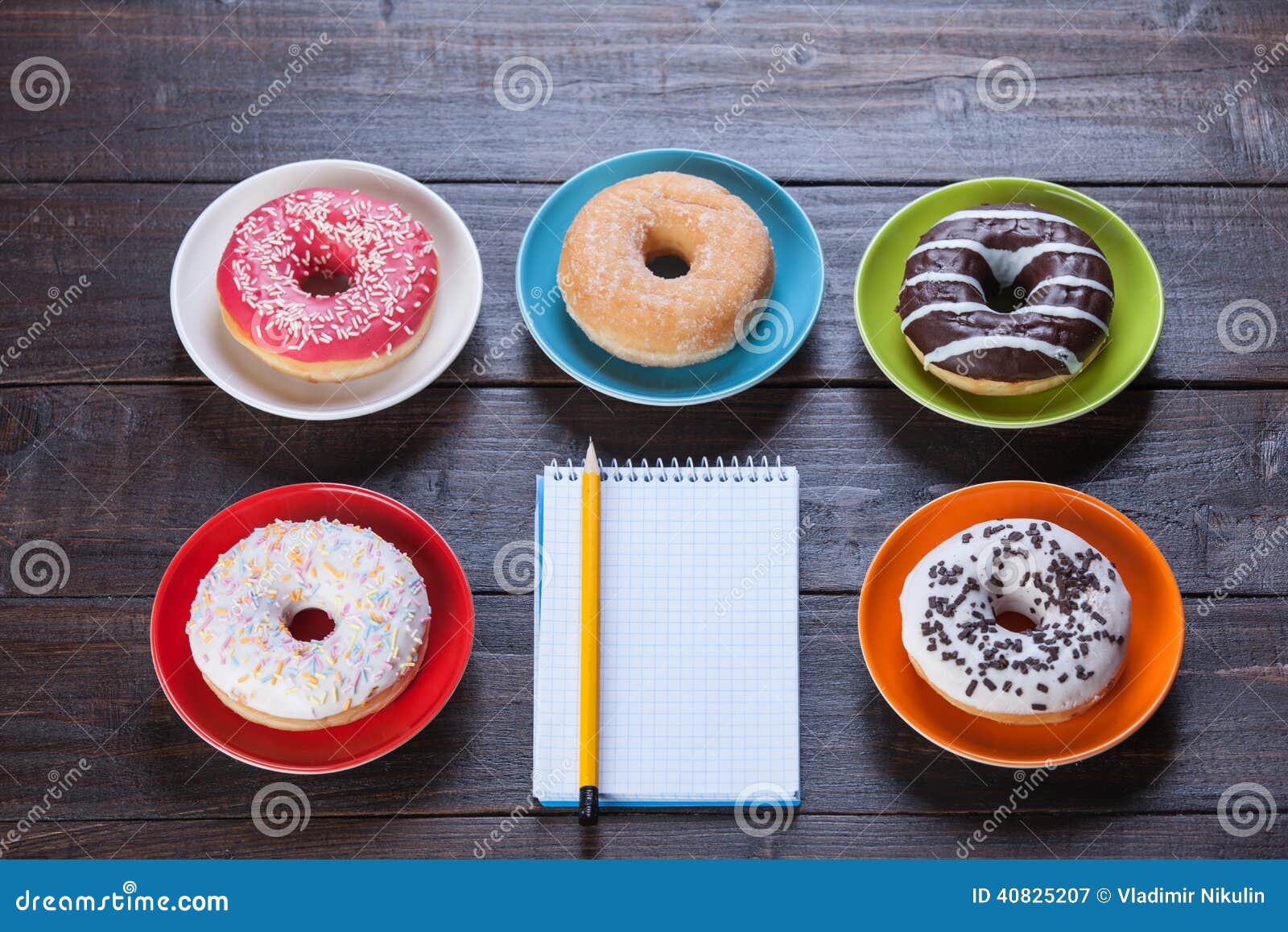 Notebook and donuts stock image. Image of food, surface - 40825207