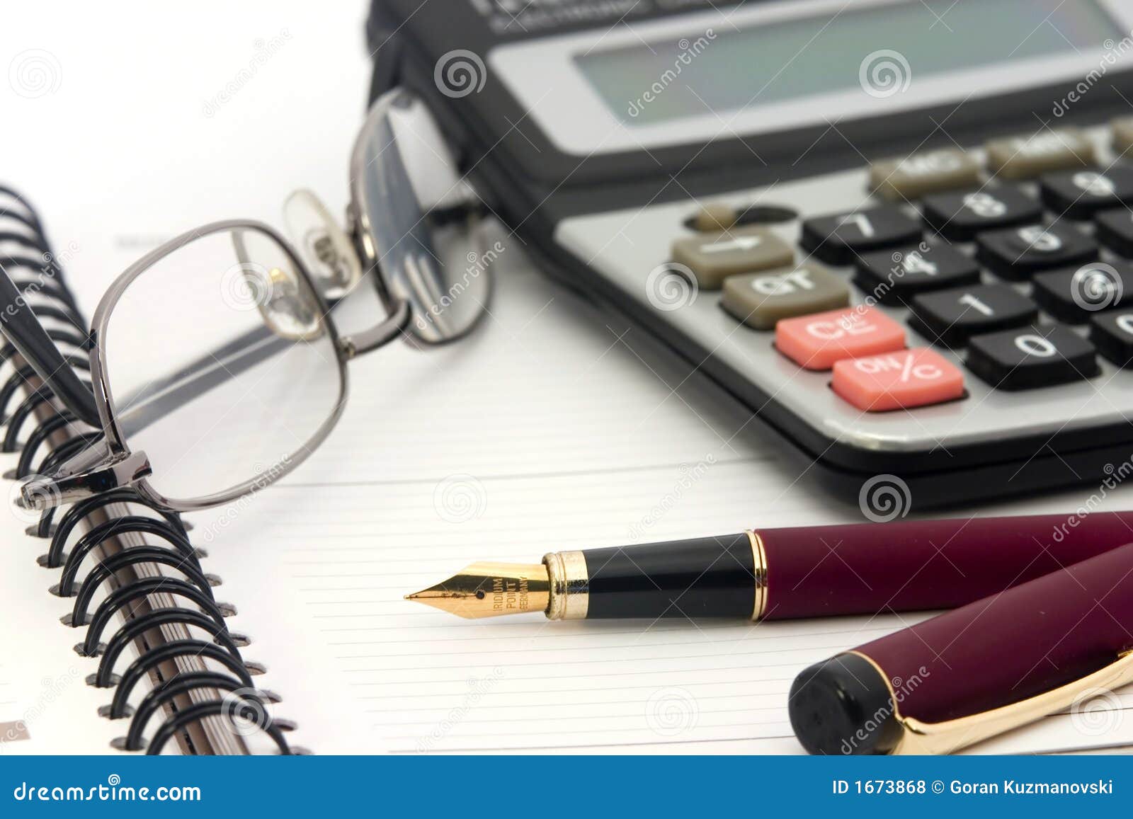 Notebook, Glasses, Calculator and Fountain Pen Stock Photo - Image of ...